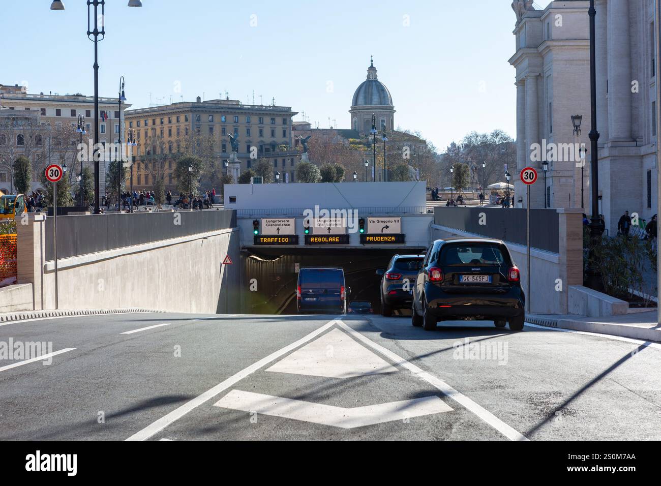 Traffic disappears into the new extension of the tunnel which runs ...