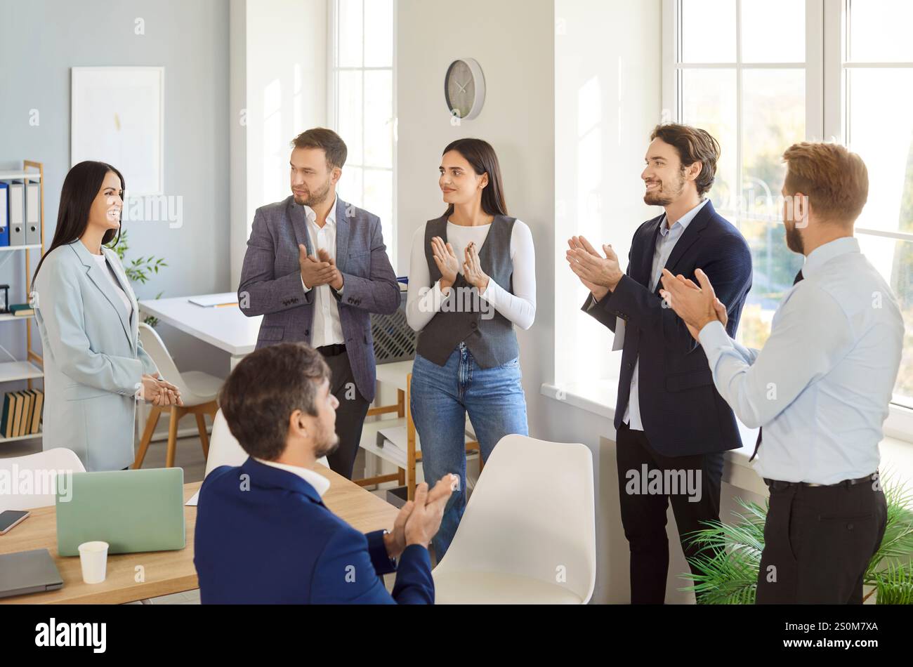 Business Team Celebrating Success With Applause During An Office ...