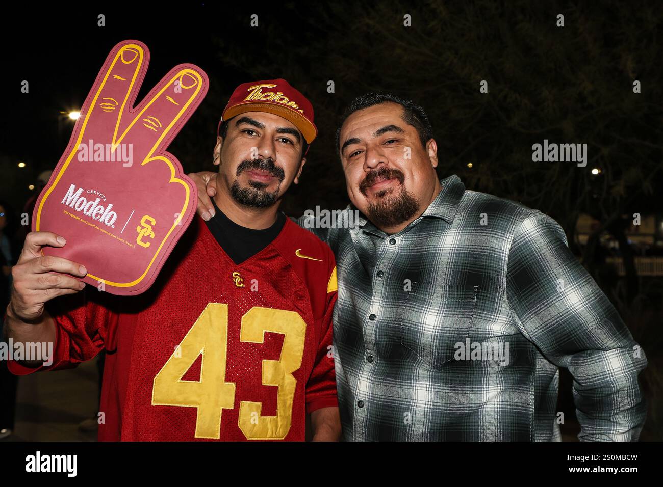 December 27, 2024: USC Trojans fans pose for a photo inside the pre ...
