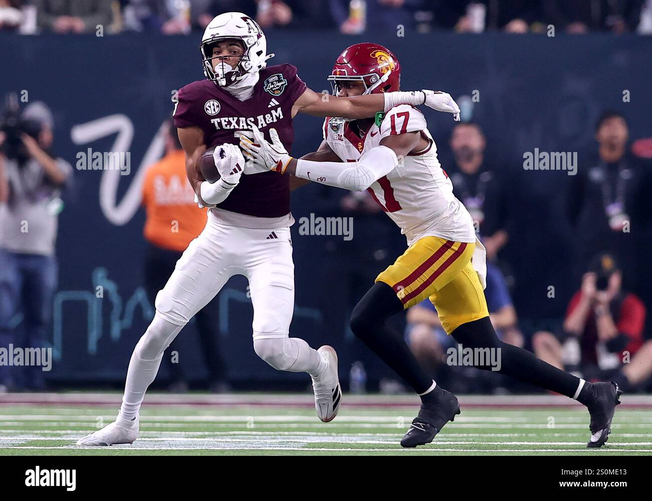 LAS VEGAS, NV - DECEMBER 27: Texas A&M Aggies wide receiver Noah Thomas (3) tries to get past ...