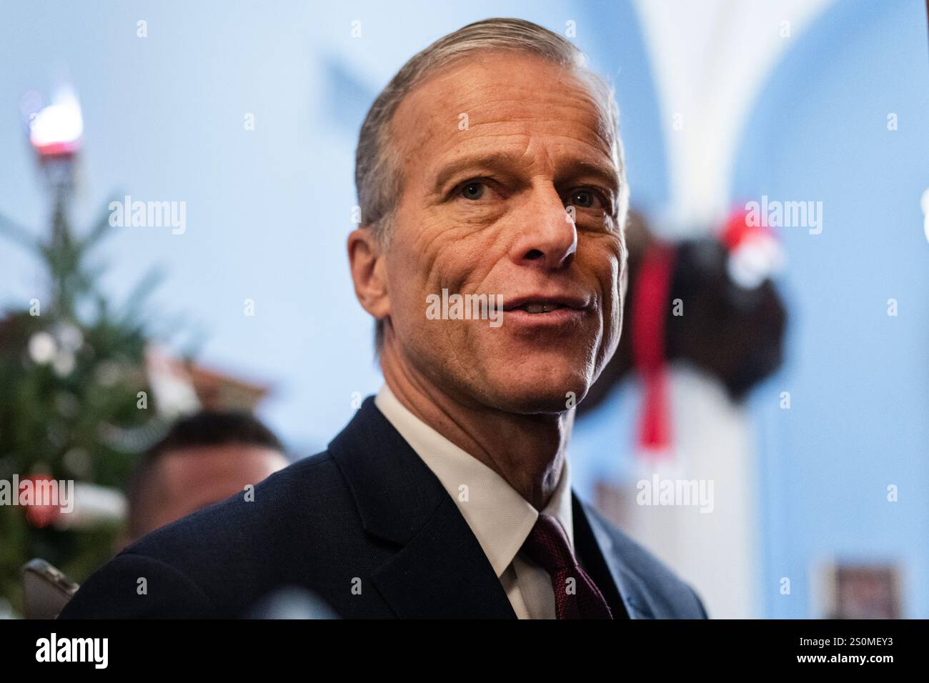 UNITED STATES - DECEMBER 17: Sen. John Thune, R-S.D., talks with ...