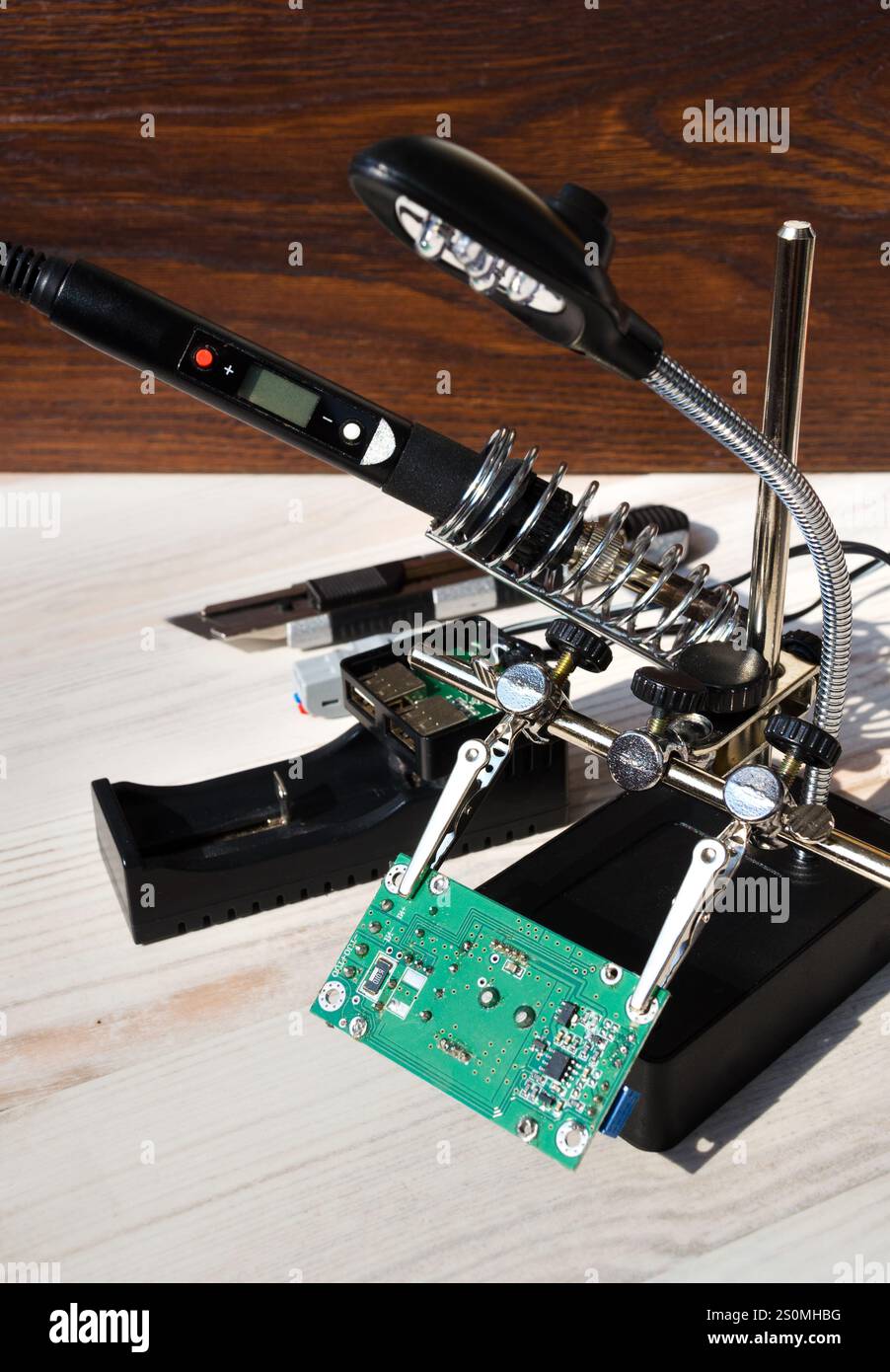 Soldering device from third parties. Pliers, knife, wires, soldering ...