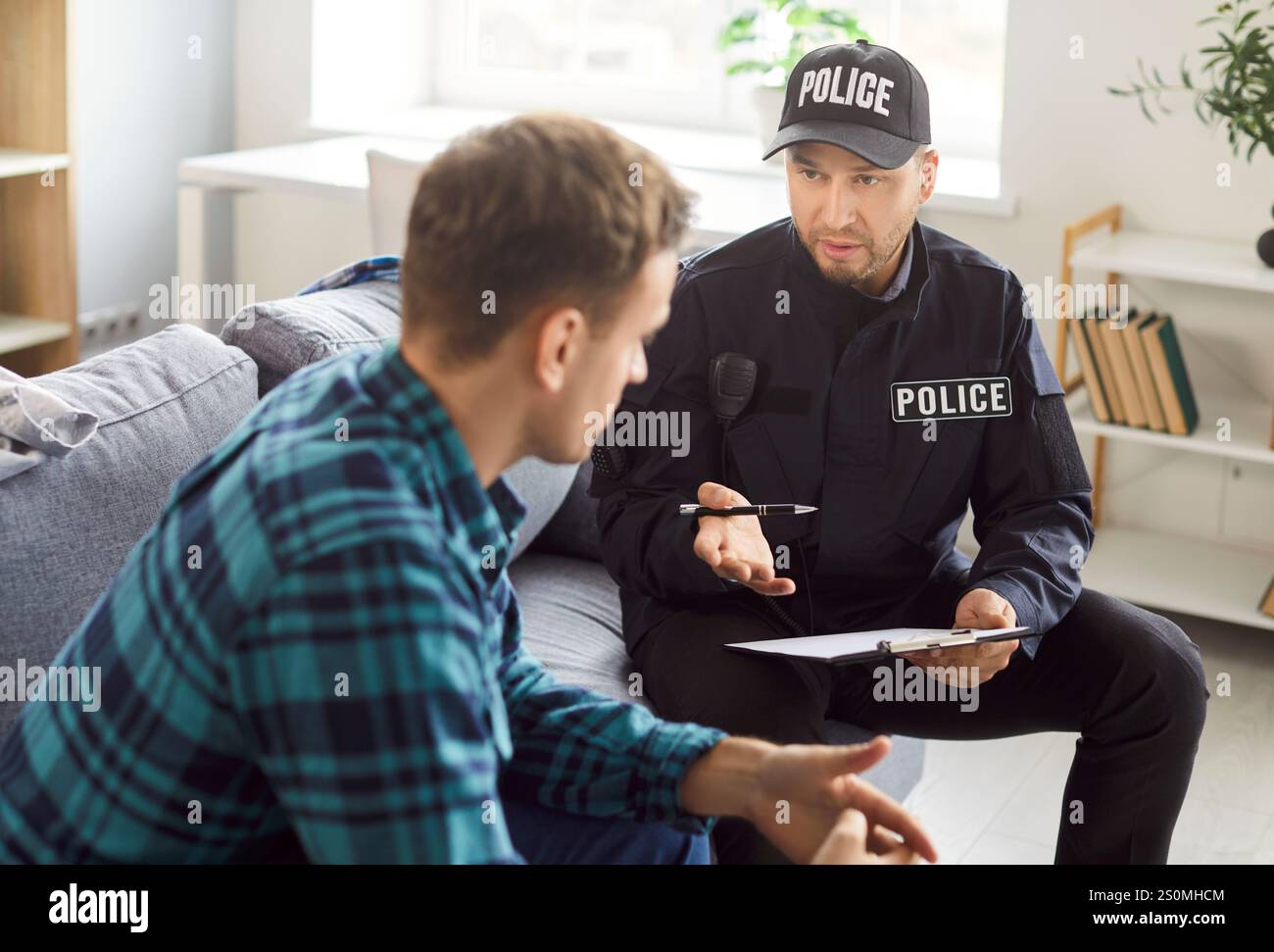 Policeman asking, officer police man in uniform writing crime reports ...