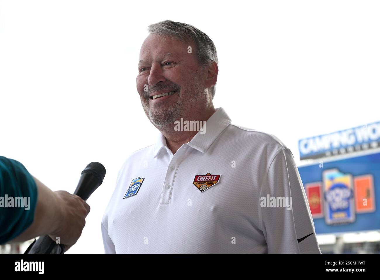 Orlando Mayor Buddy Dyer is interviewed at the Citrus Bowl football ...