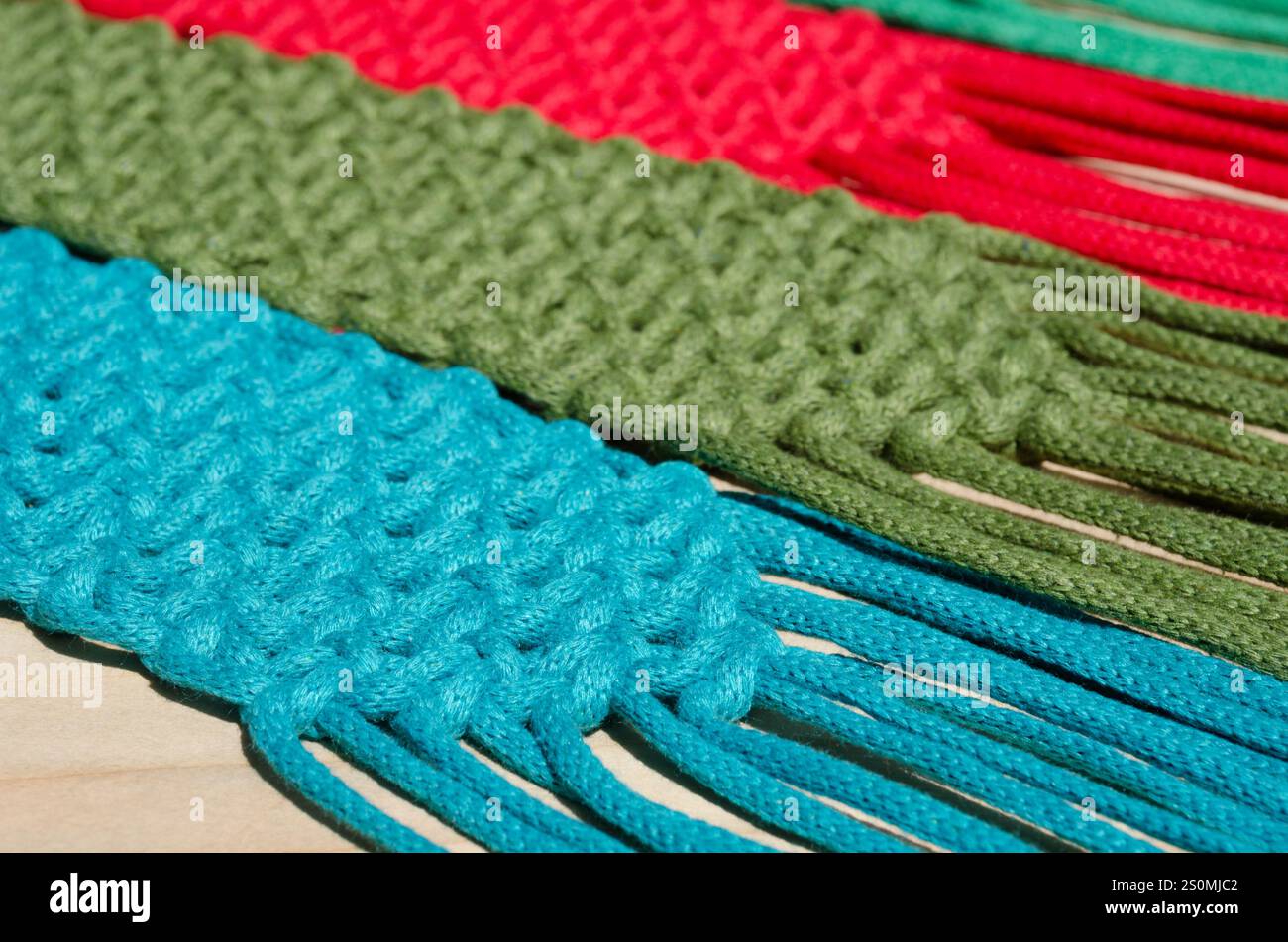 Wicker patterns. Macrame, a square knot of multi-colored threads Stock ...