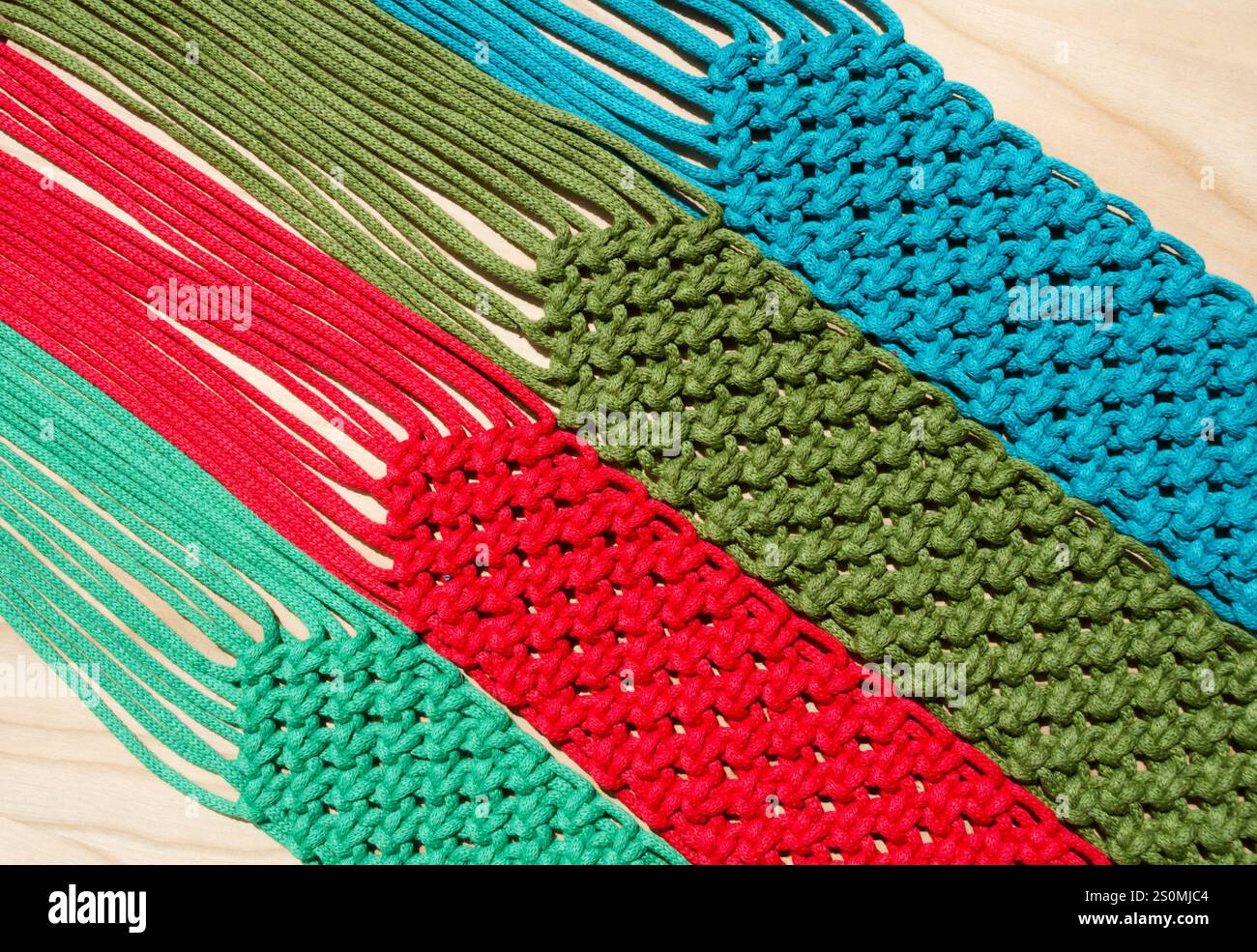 Wicker patterns. Macrame, a square knot of multi-colored threads Stock ...