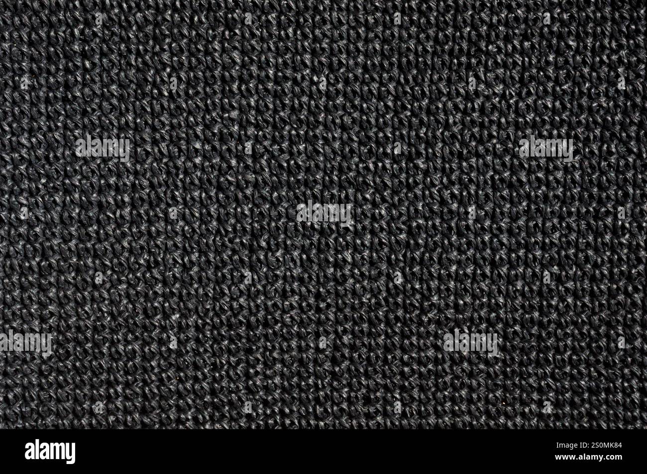 Crochet pattern in black raffia. Wicker texture as a background Stock ...