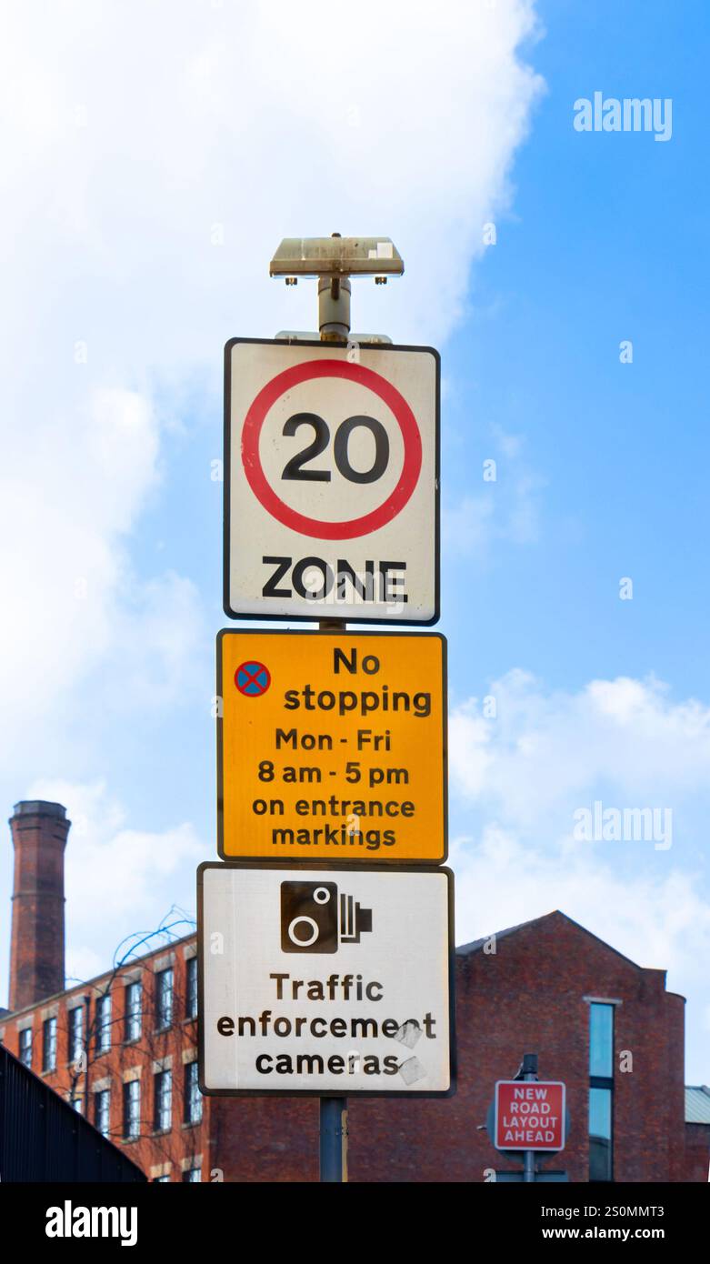 Traffic sign indicating a 20 zone with no stopping restriction and ...