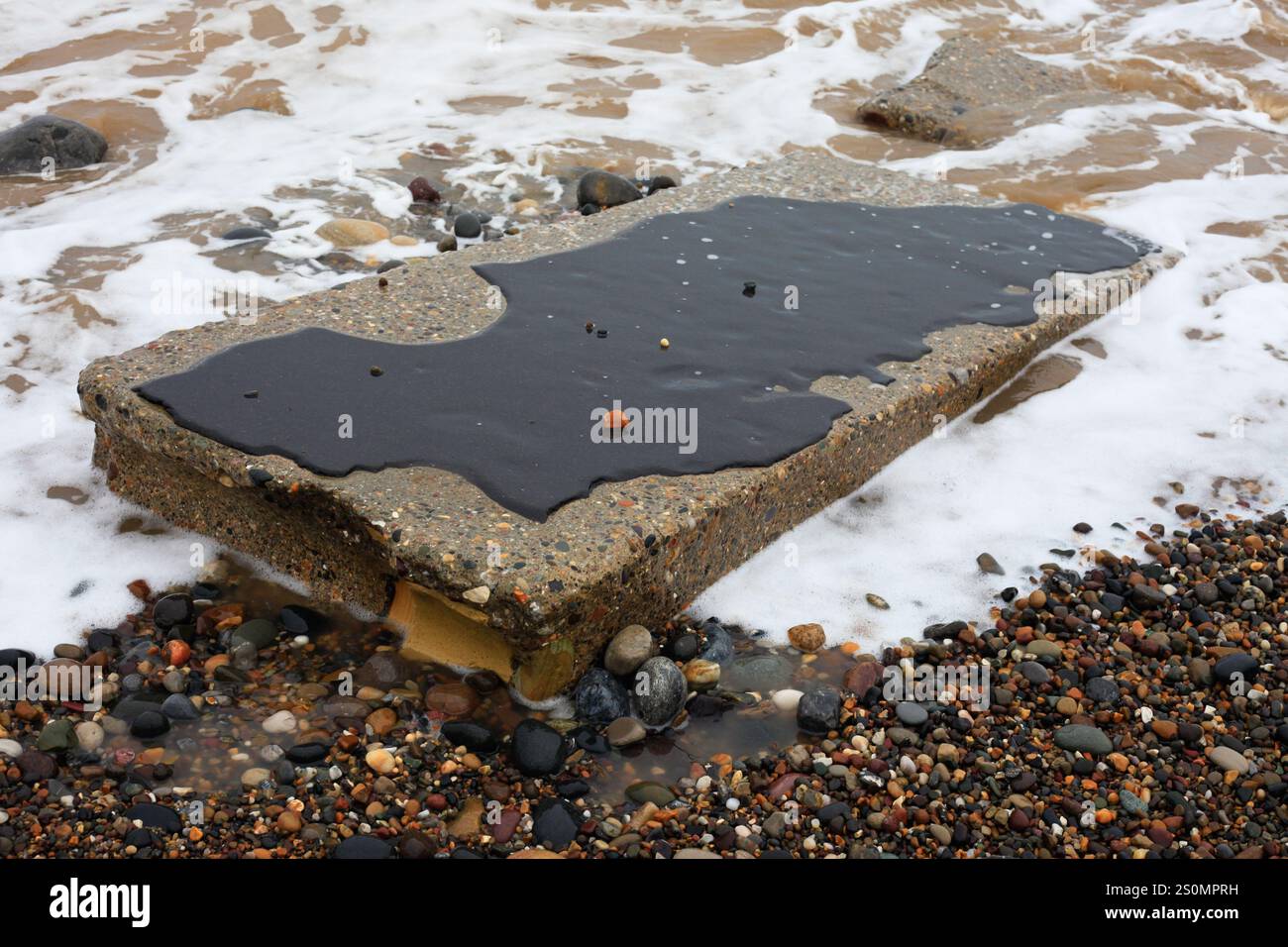WW2 concrete military installations on beach Coastal erosion at Spurn ...