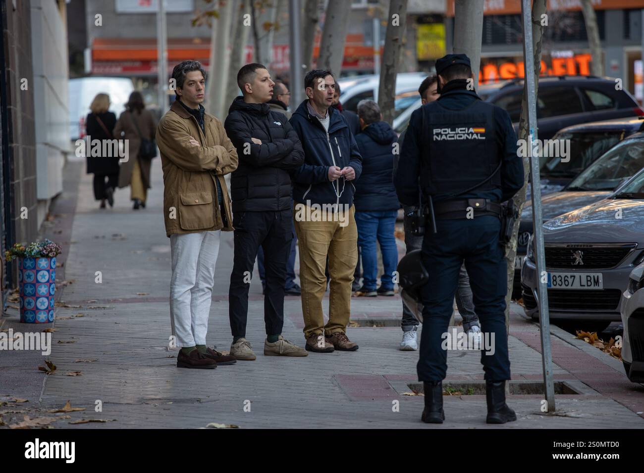 Madrid, Spain. 28th Dec, 2024. A group of ultra-Catholic activists pray ...