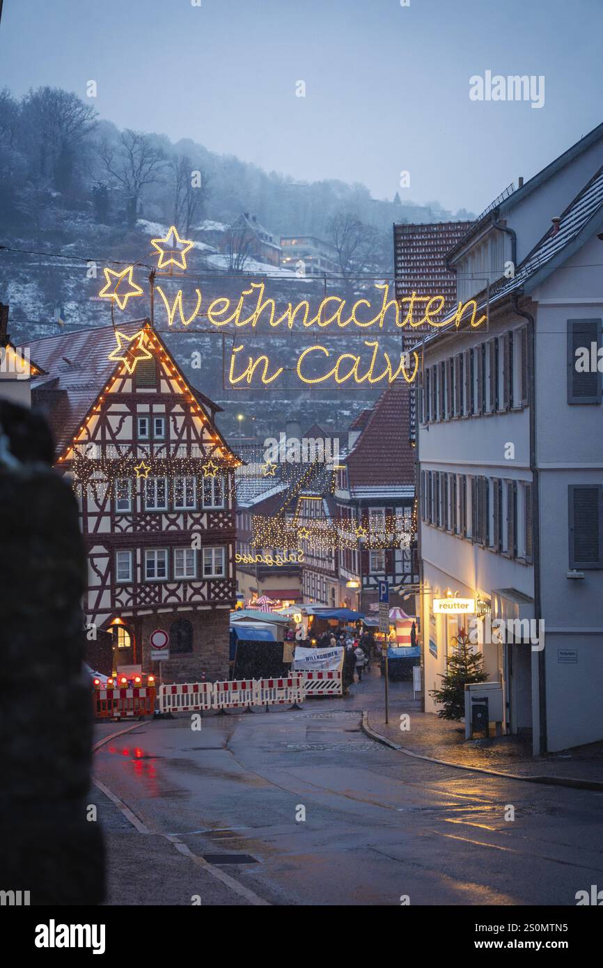 Illuminated street with lettering 'Christmas in Calw' and half-timbered ...