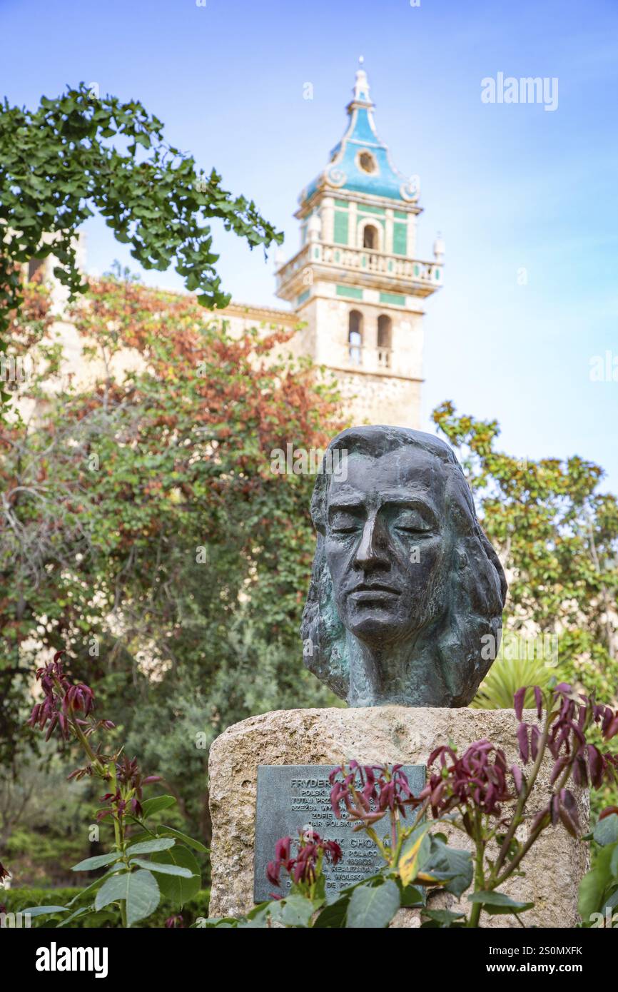 Bronze bust of Frederic Chopin in monastery garden in front of a ...