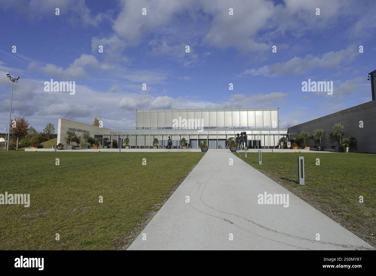 Wuerth Museum 2, Modern building with a glass front under a clear blue ...