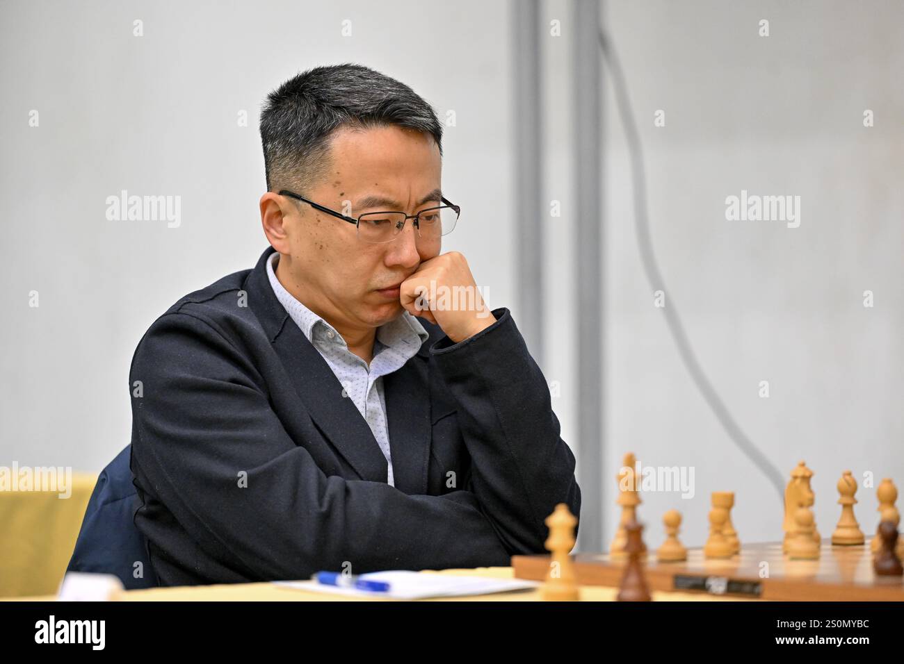 Hastings, UK. 28th Dec, 2024. Pengxiang Zhang gm CHN during the 98th ...