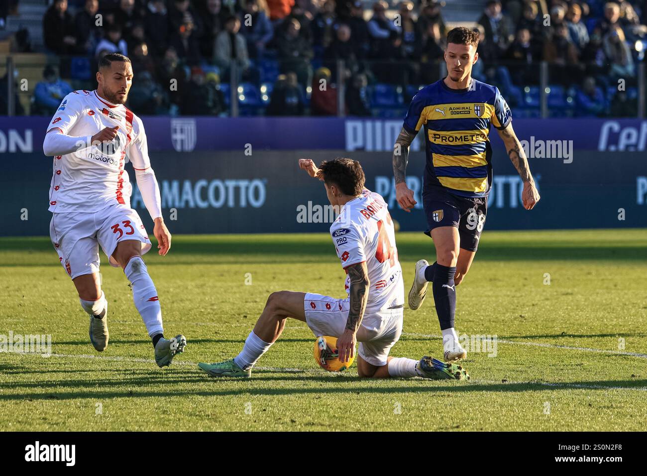 Parma, Italy. 28th Dec, 2024. Alessandro Bianco (AC Monza) fights for ...