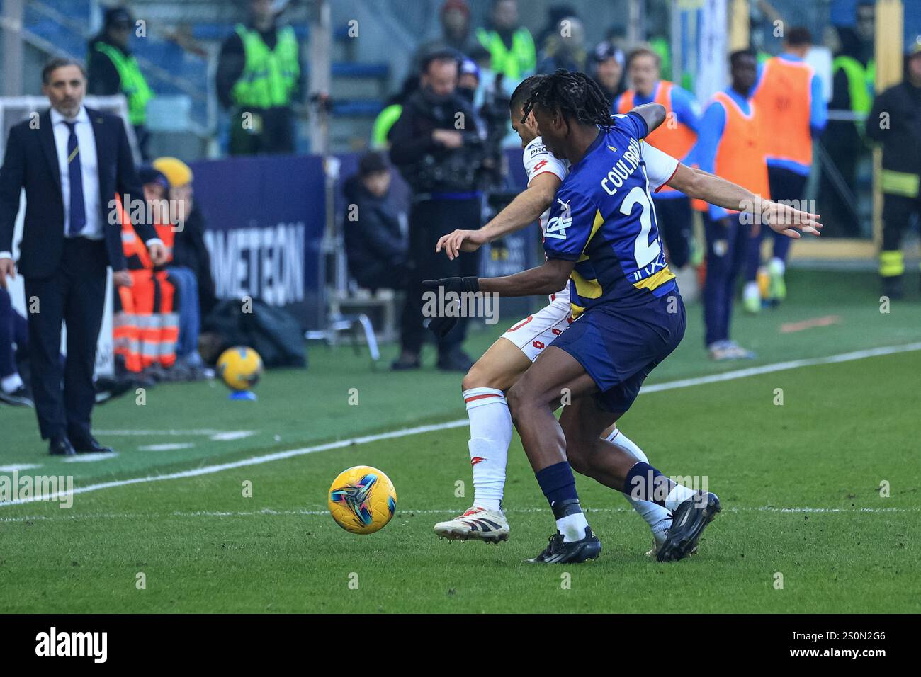 Parma, Italy. 28th Dec, 2024. Woyo Coulibaly (Parma Calcio) fights for ...
