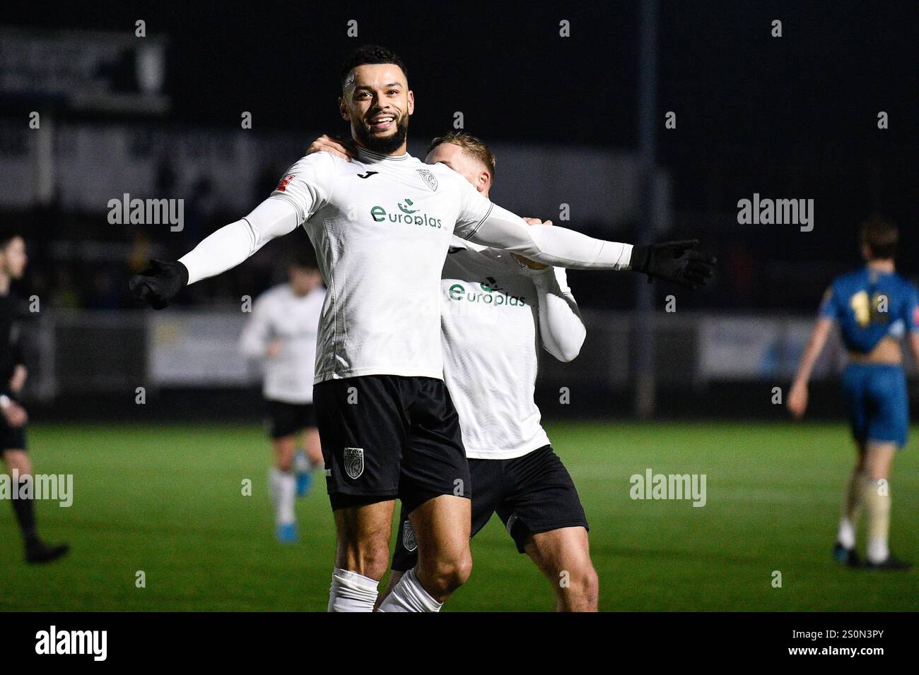 Merthyr, UK. 28th Dec, 2024. Kane Simpson of Merthyr Town celebrates ...