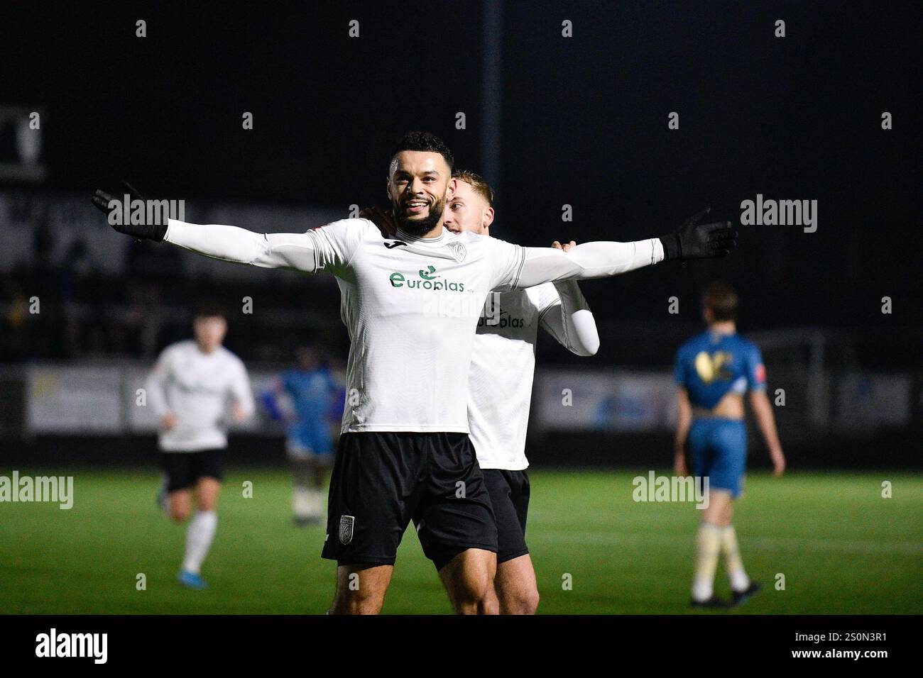 Merthyr, UK. 28th Dec, 2024. Kane Simpson of Merthyr Town celebrates ...