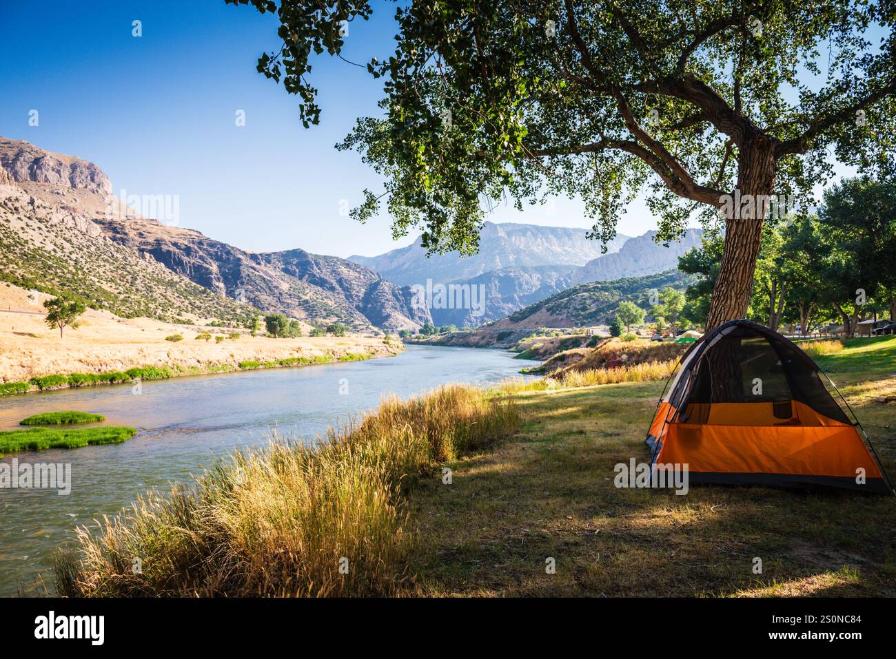 Tent and campsite at waters edge in Poison Creek Campground at Boysen ...