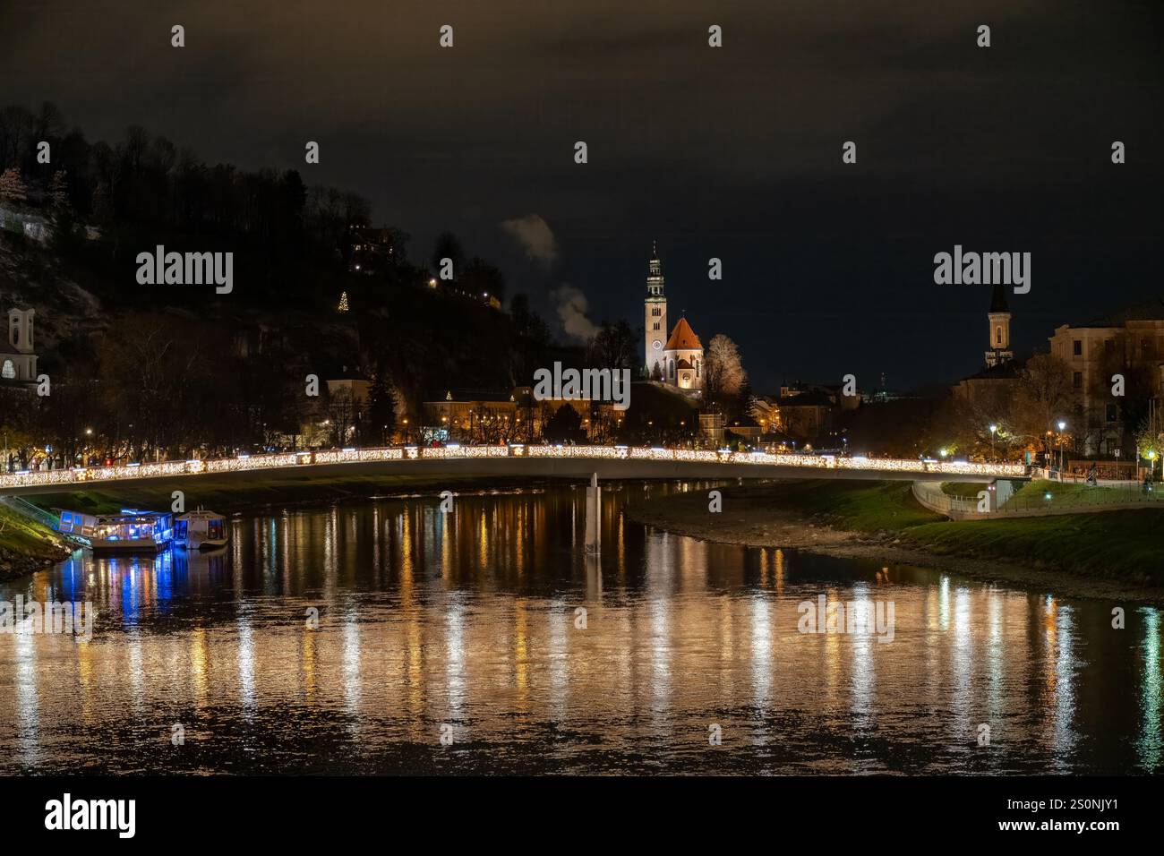 Cityscape at night of Salzburg, Austria with a view of the love lock ...