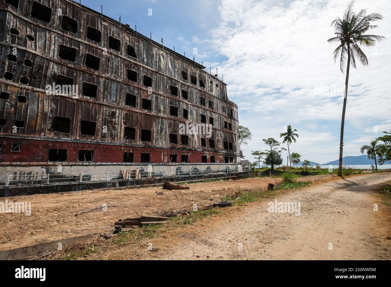 A view of the burnt facade of The Abandoned Galaxy "Ghost Ship" Hotel ...