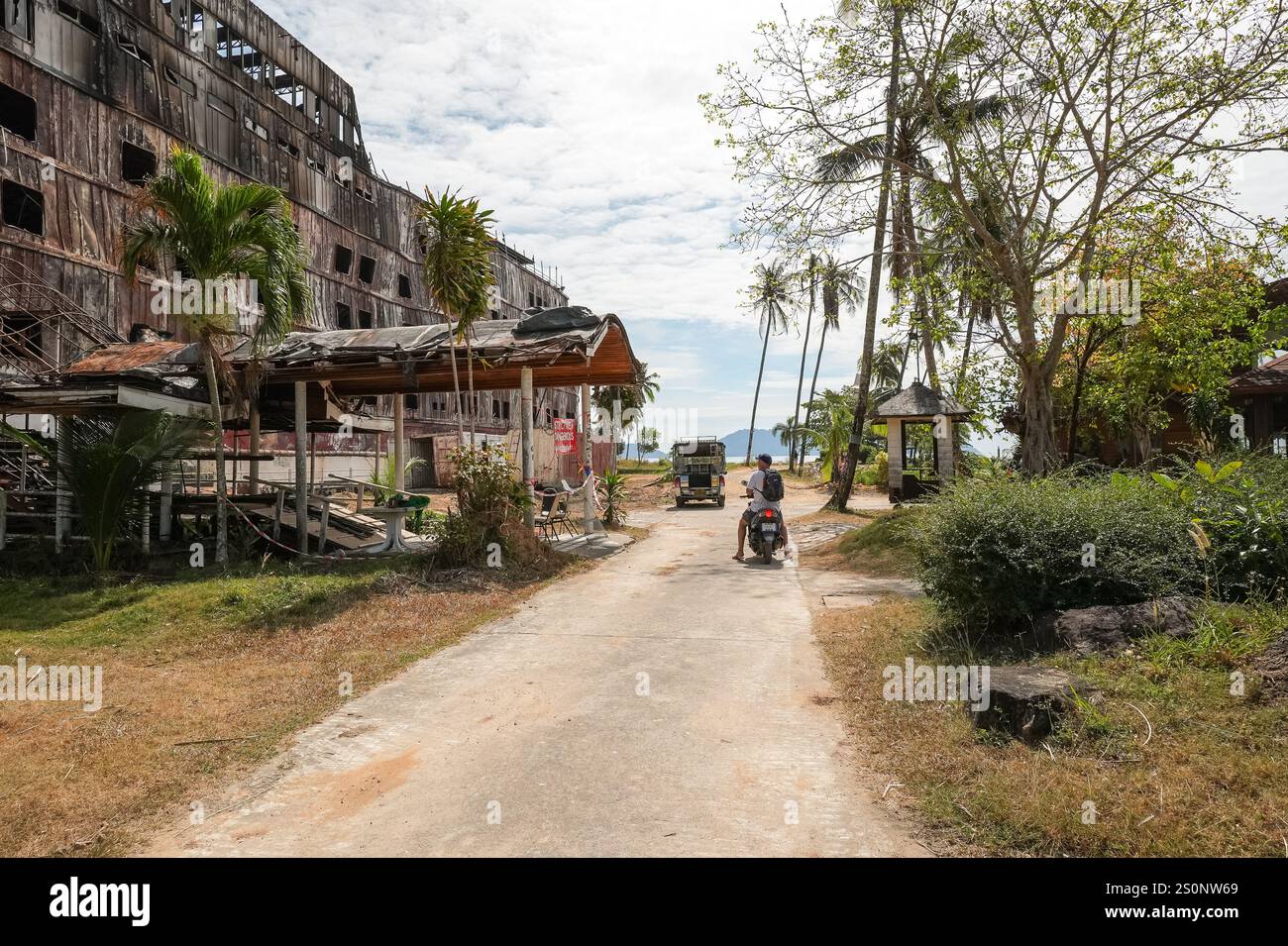 A visitor on a motorbike is seen looking at The Abandoned Galaxy "Ghost ...