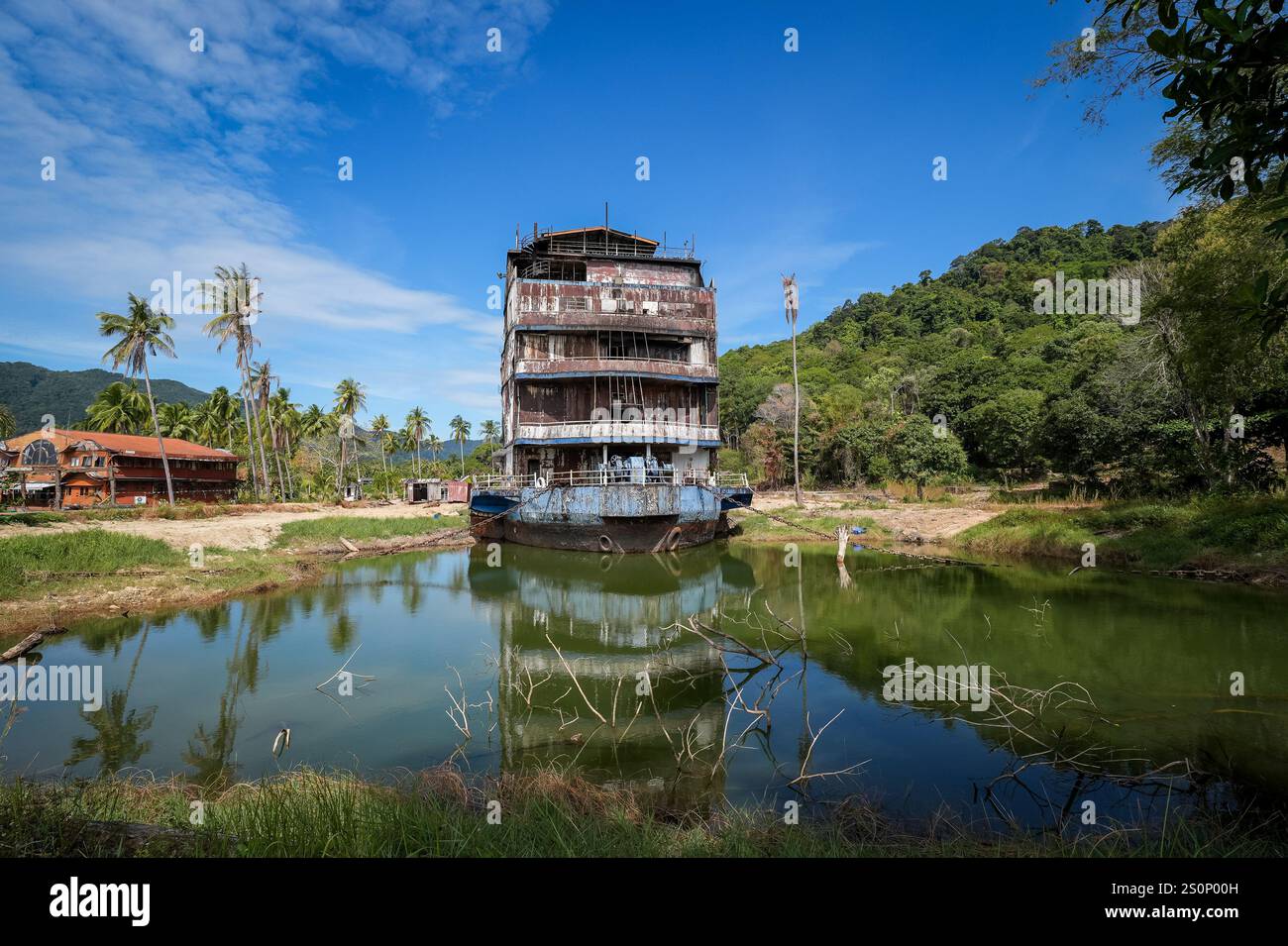 A front view of the Abandoned Galaxy "Ghost Ship" Hotel, on a sunny day ...