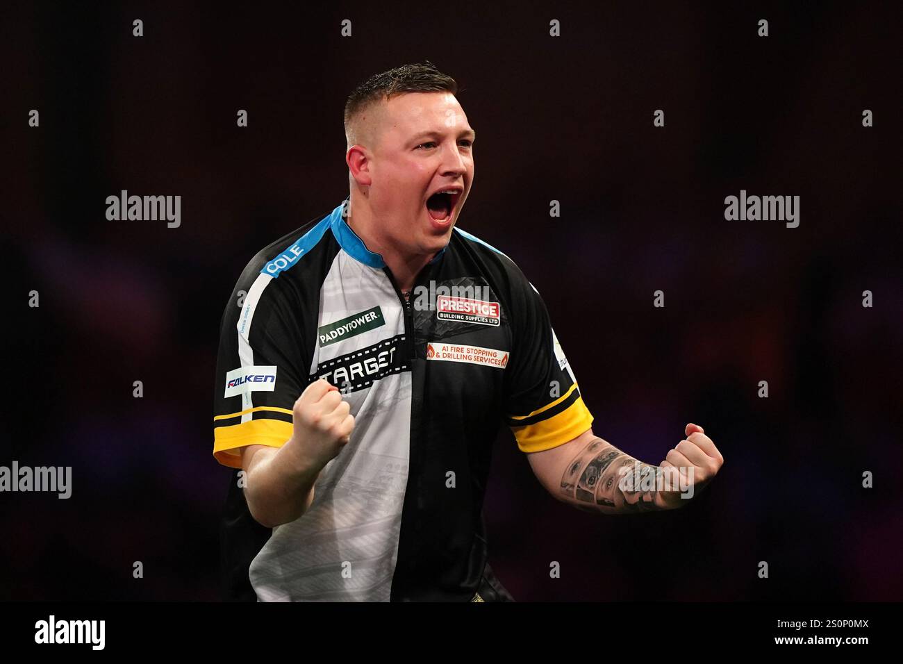 Chris Dobey celebrates after winning his third round match against Josh ...