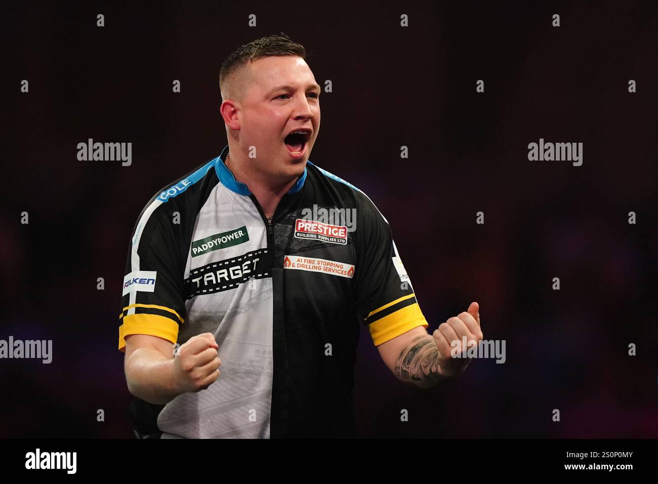 Chris Dobey celebrates after winning his third round match against Josh ...