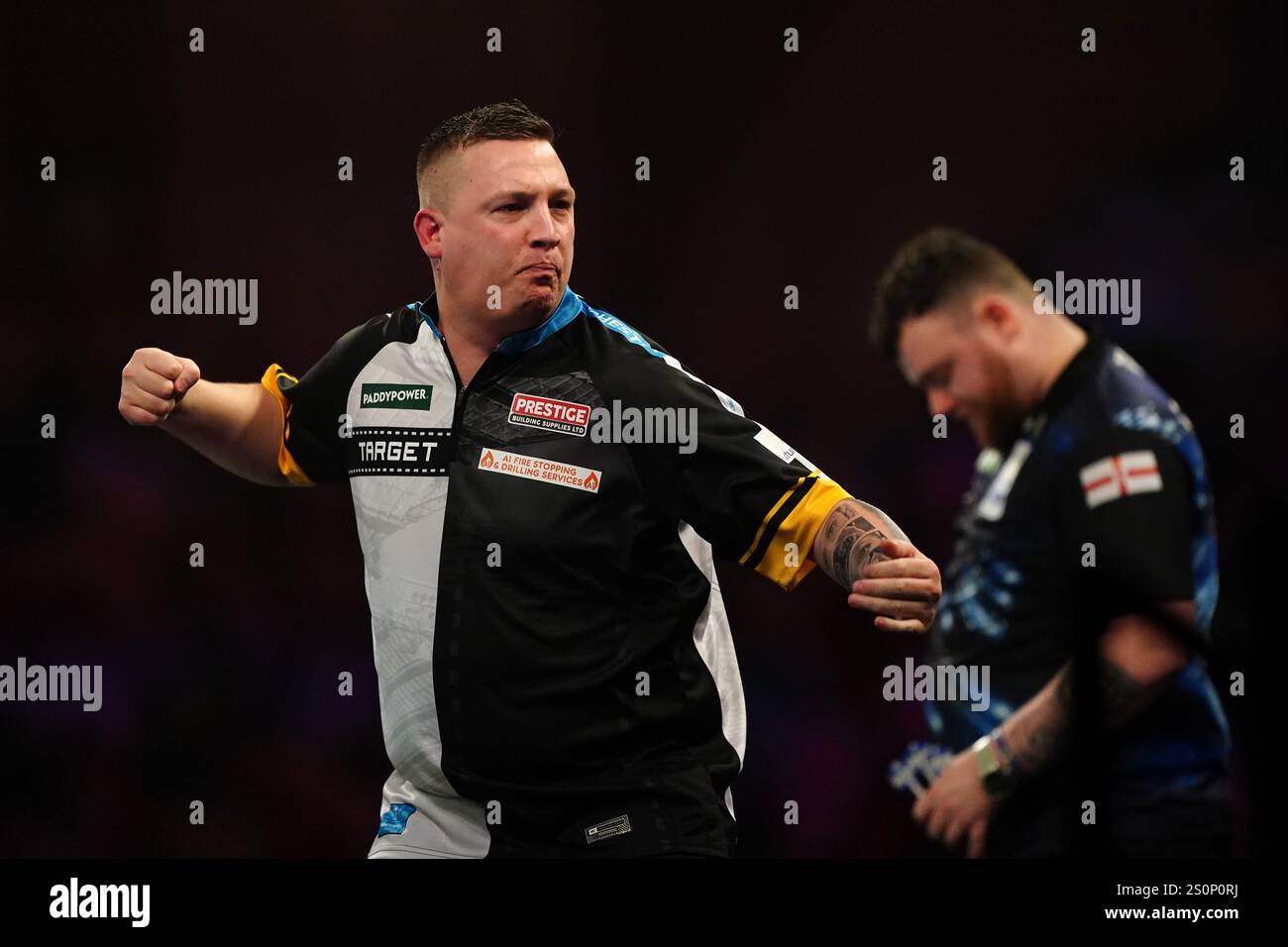 Chris Dobey celebrates after winning his third round match against Josh ...