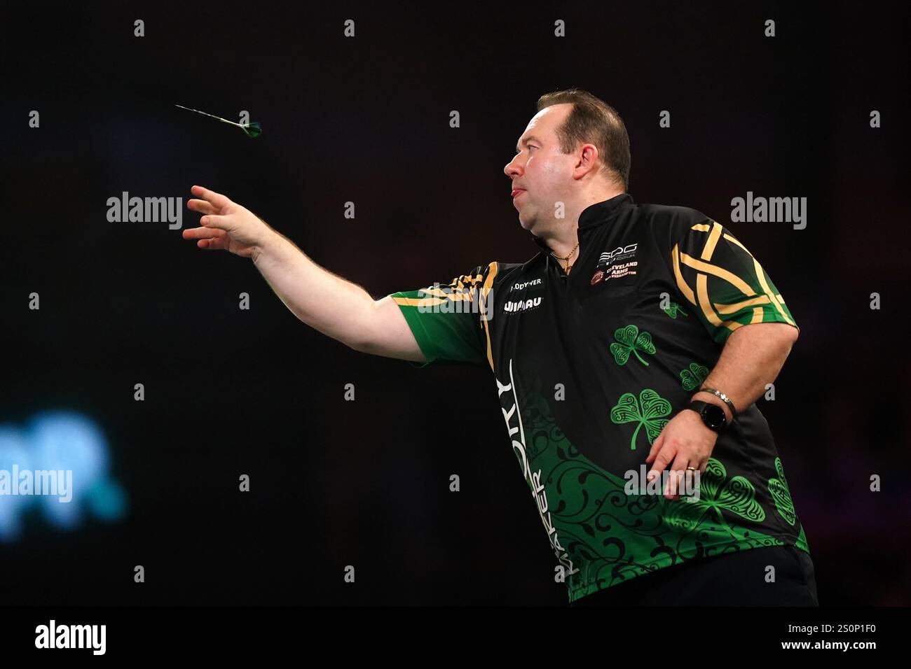Brendan Dolan in action during his third round match against Michael van Gerwen (not pictured ...