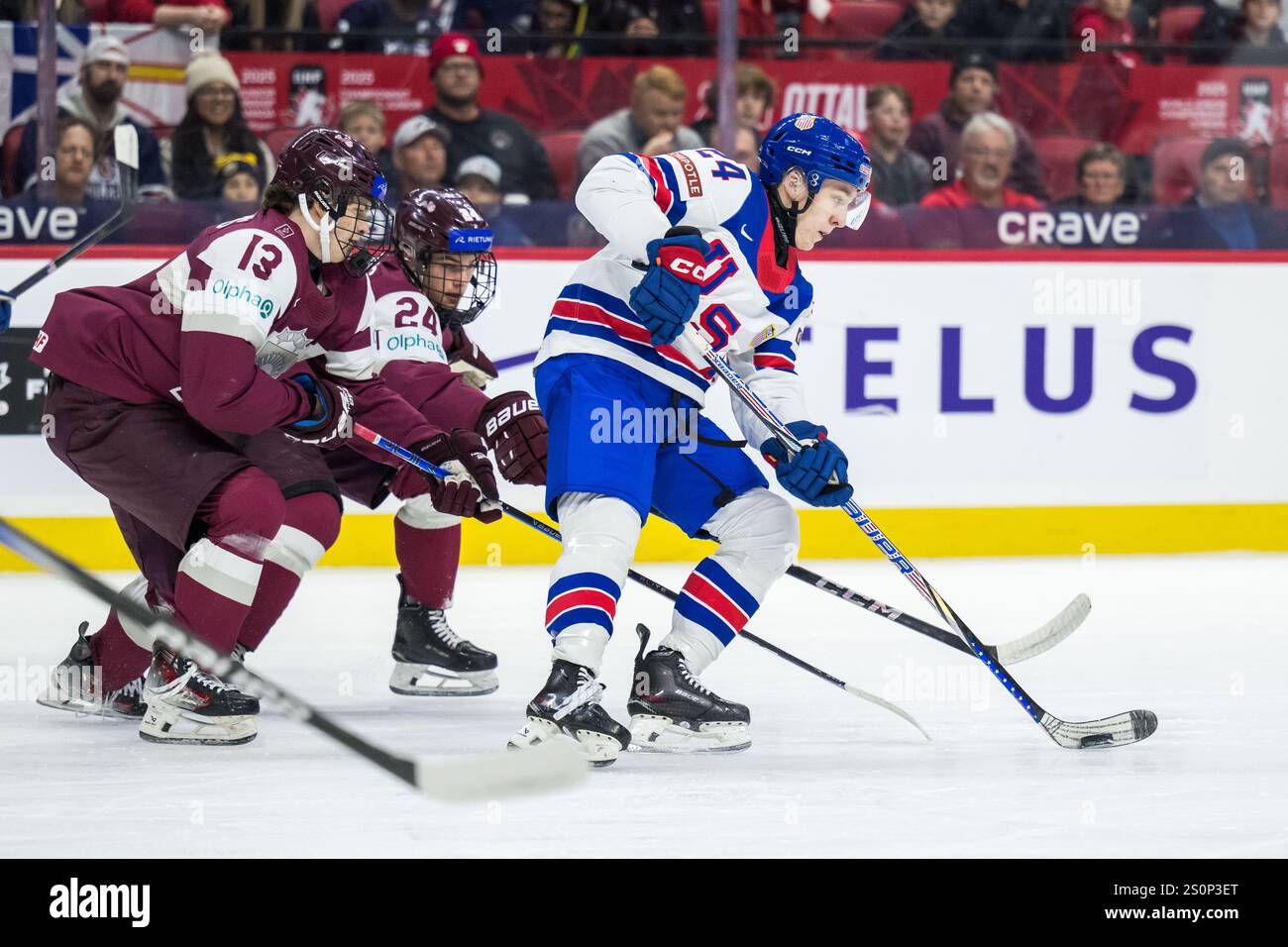 Martins Klaucans and Daniels Serkins of, Latvia. , . and Cole Hutson of ...