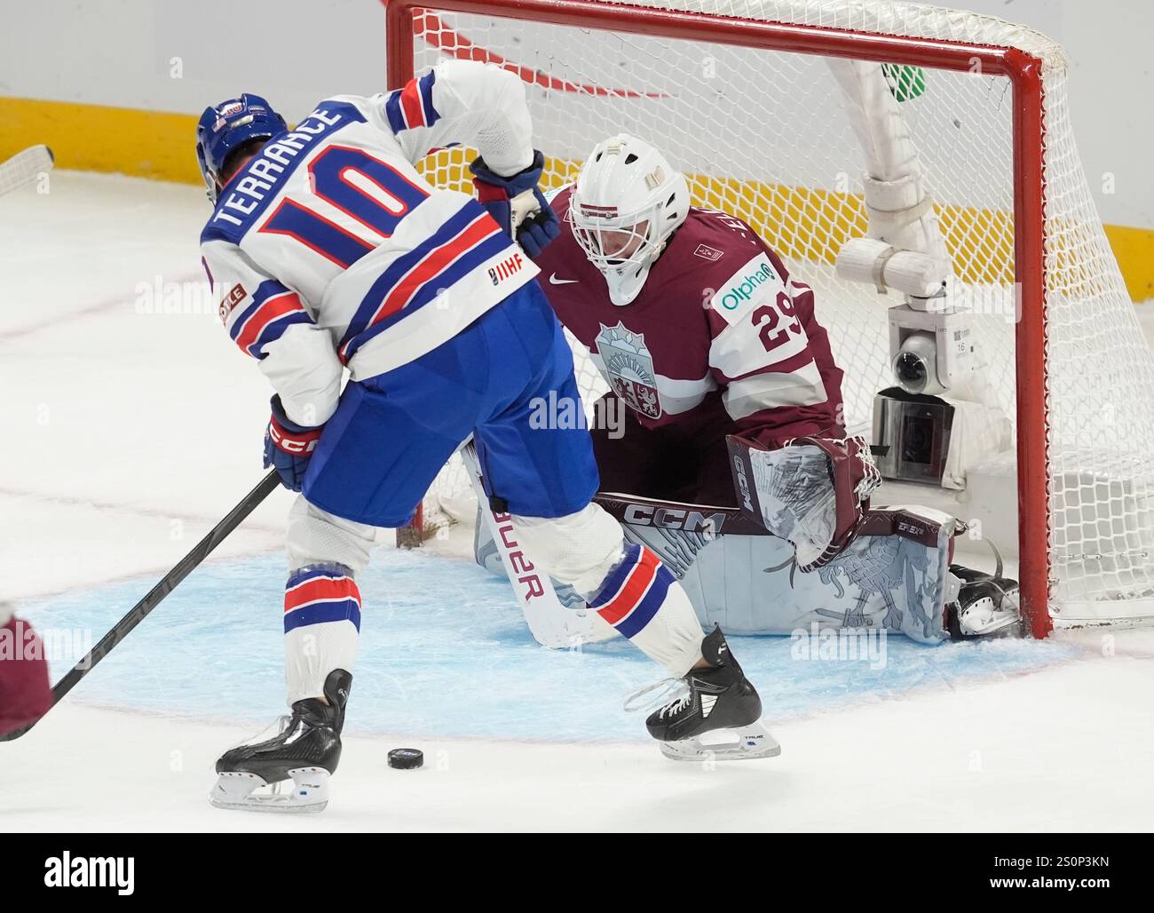 Ottawa, Canada. 28th Dec, 2024. USA forward Carey Terrance (10) tries ...
