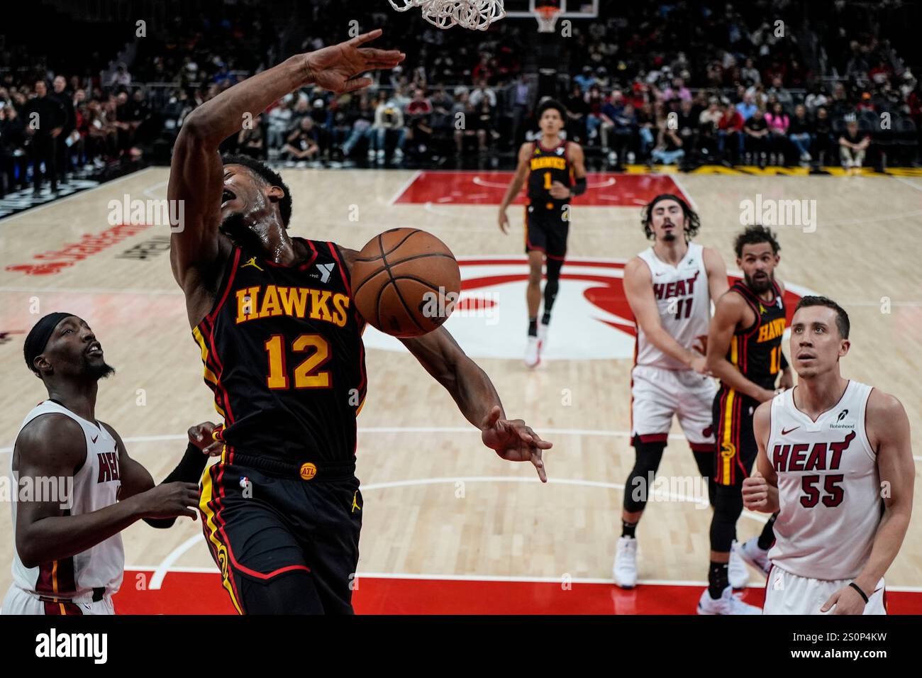Atlanta Hawks forward De'Andre Hunter (12) dunks against the Miami Heat ...