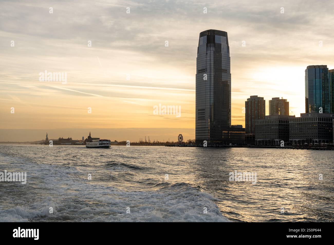 Riding on a boat down the Hudson River on a late fall evening observing ...