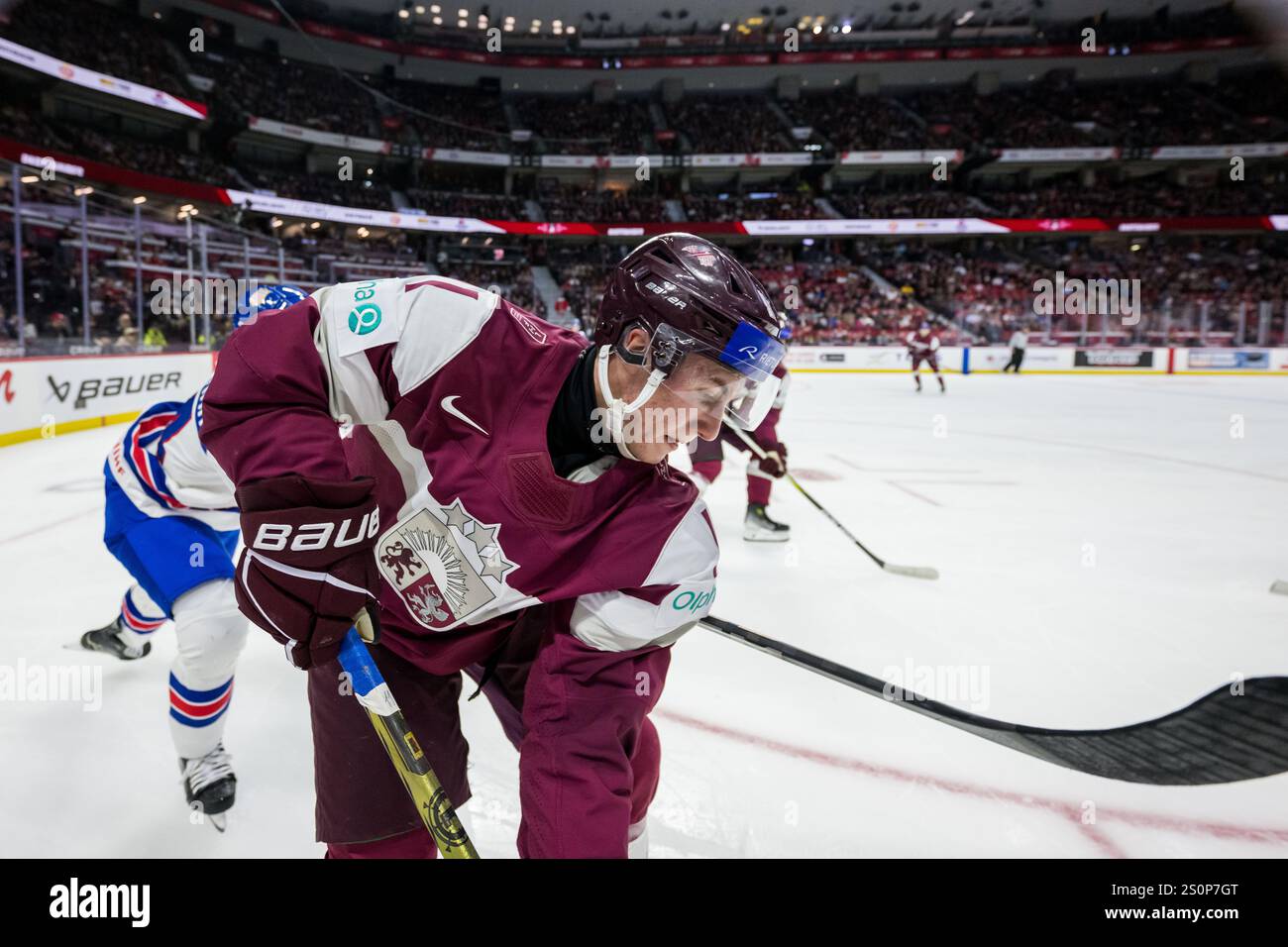 Dmitrijs Dilevka of, Latvia. , . during the 2025 IIHF World Junior ...
