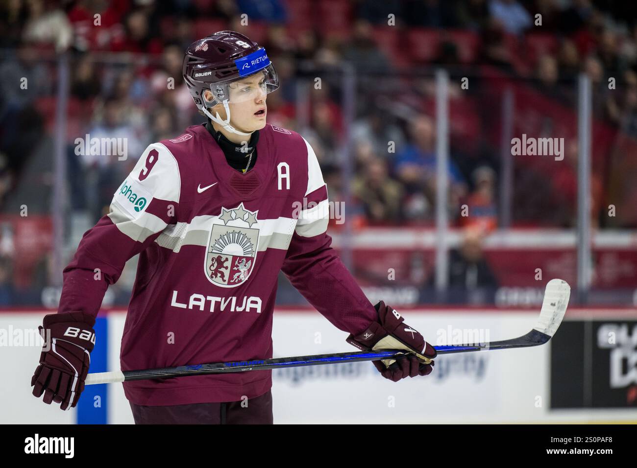 Eriks Mateiko of, Latvia. , . during the 2025 IIHF World Junior ...