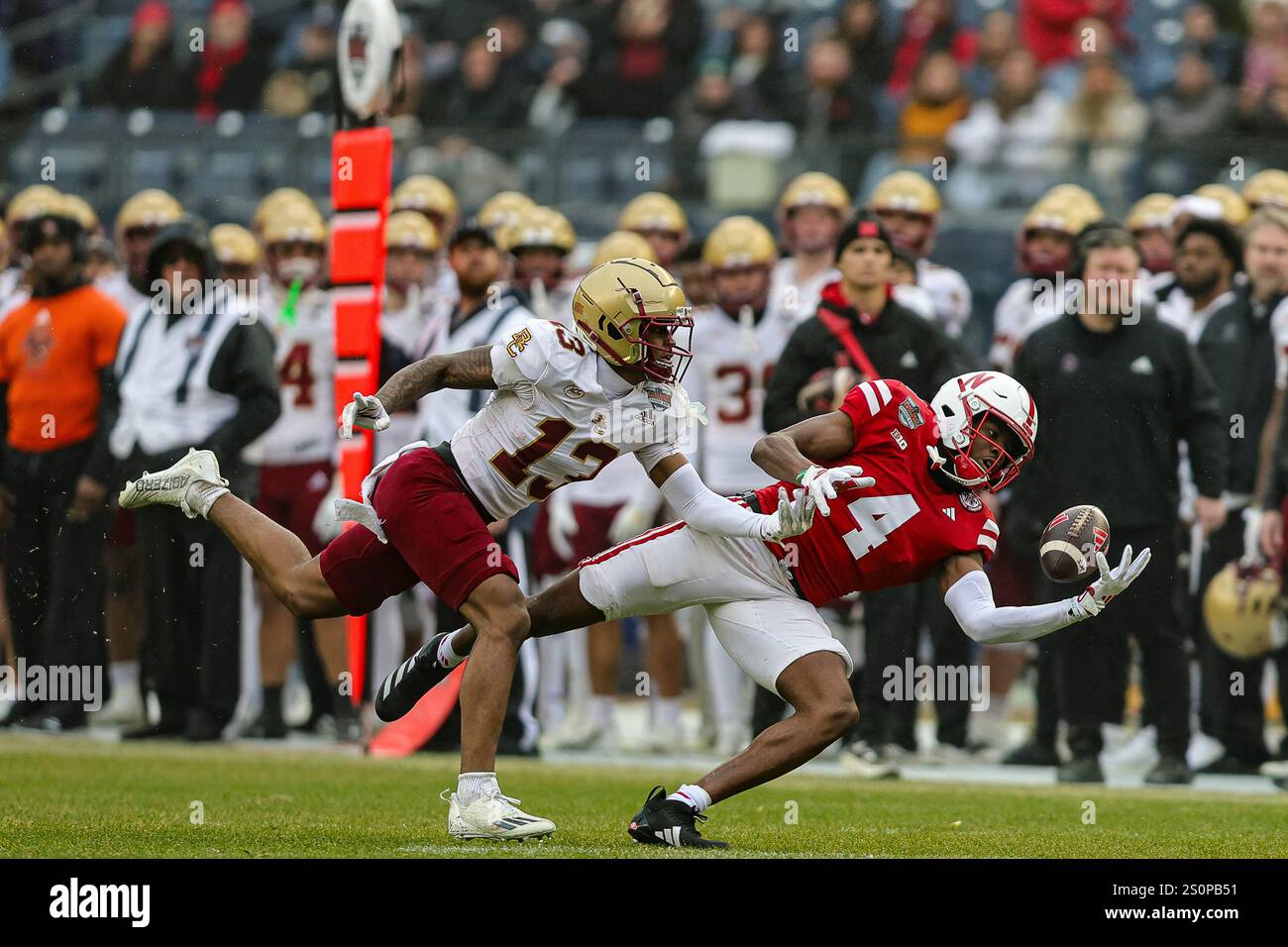 Bronx, New York, USA. 28th Dec, 2024. Nebraska Cornhuskers wide receiver JAHMAL BANKS (4) dives ...