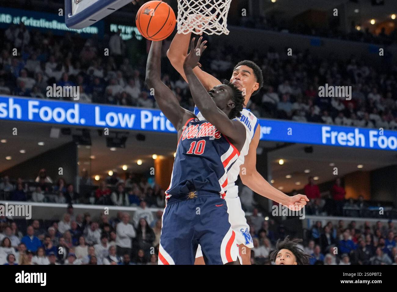 Mississippi forward John Bol (10) shoot the ball past Memphis forward ...