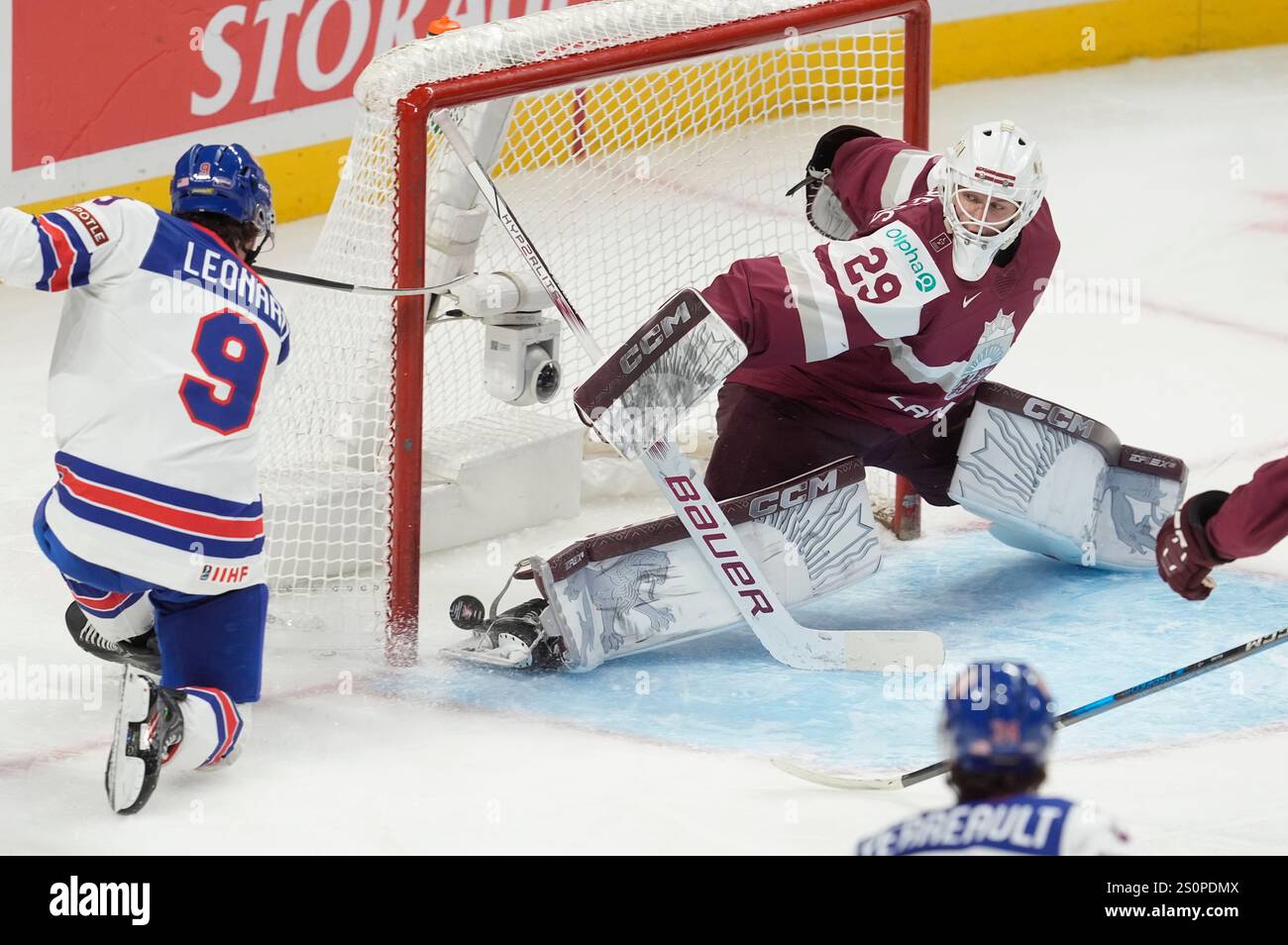Ottawa, Canada. 28th Dec, 2024. USA forward Ryan Leonard (9) scores on ...