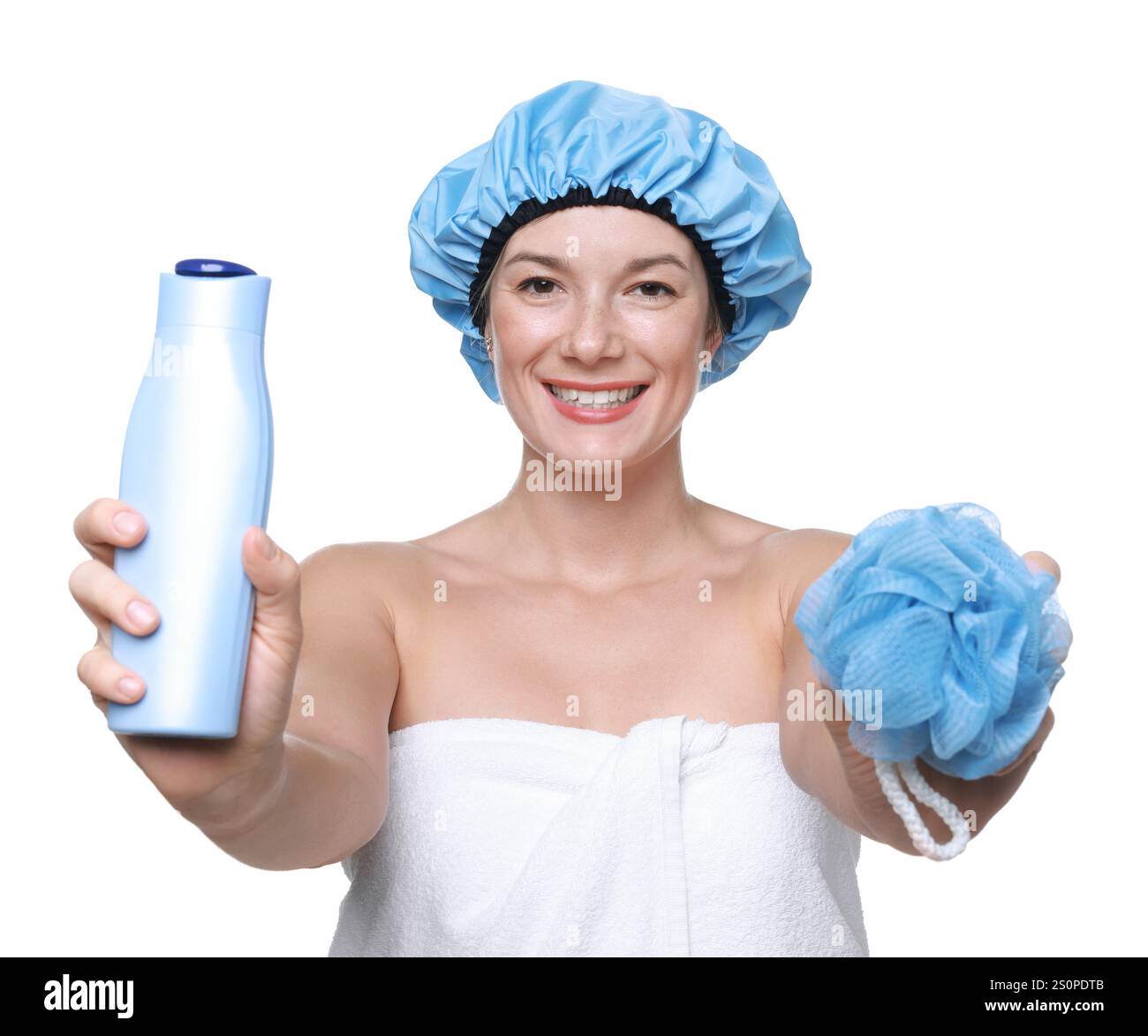 Woman with blue shower cap, mesh sponge and shampoo on white background ...