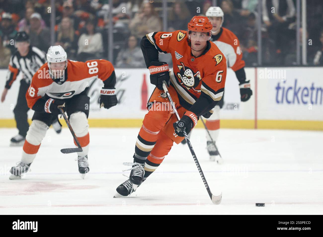 Anaheim Ducks defenseman Brian Dumoulin (6) moves the puck against the ...