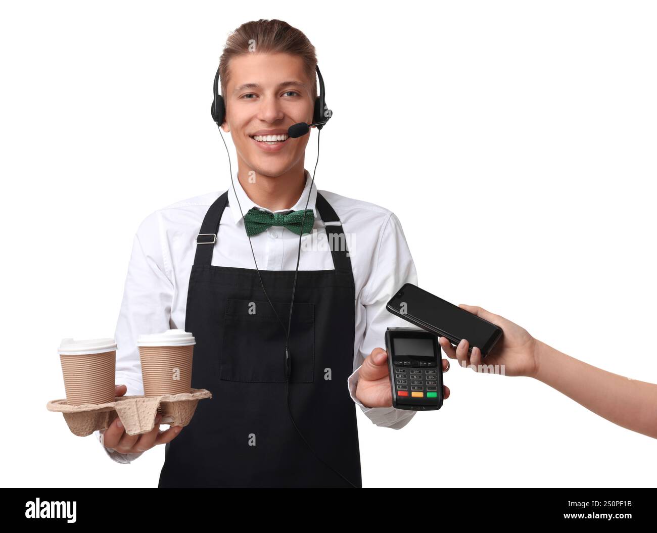 Fast-food worker taking payment from client via terminal on white ...