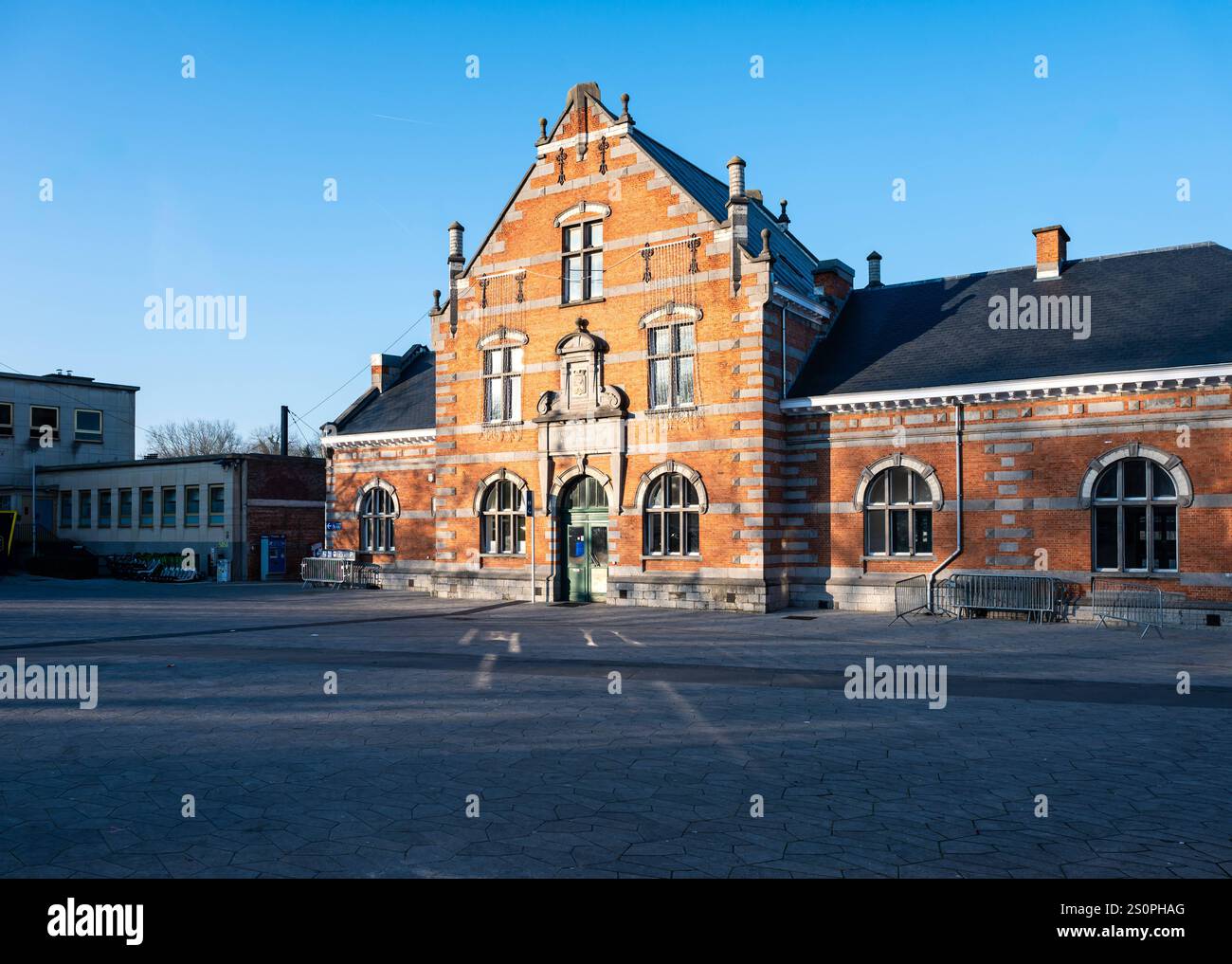 Jette railway station with classical brick stone facade at the Cardinal ...