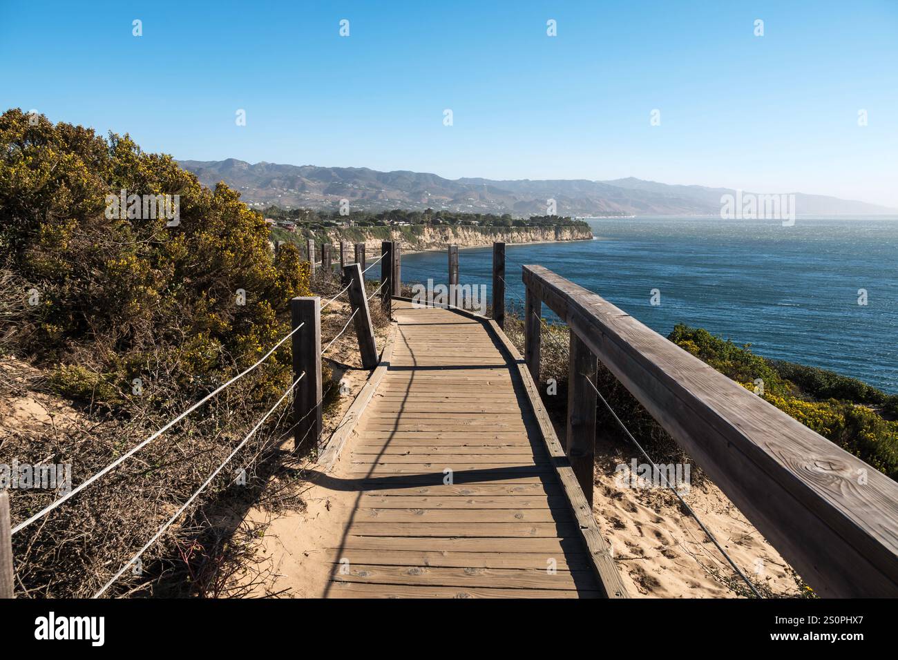 Wood boardwalk hiking trail above remote Dume Cove beach in Malibu ...