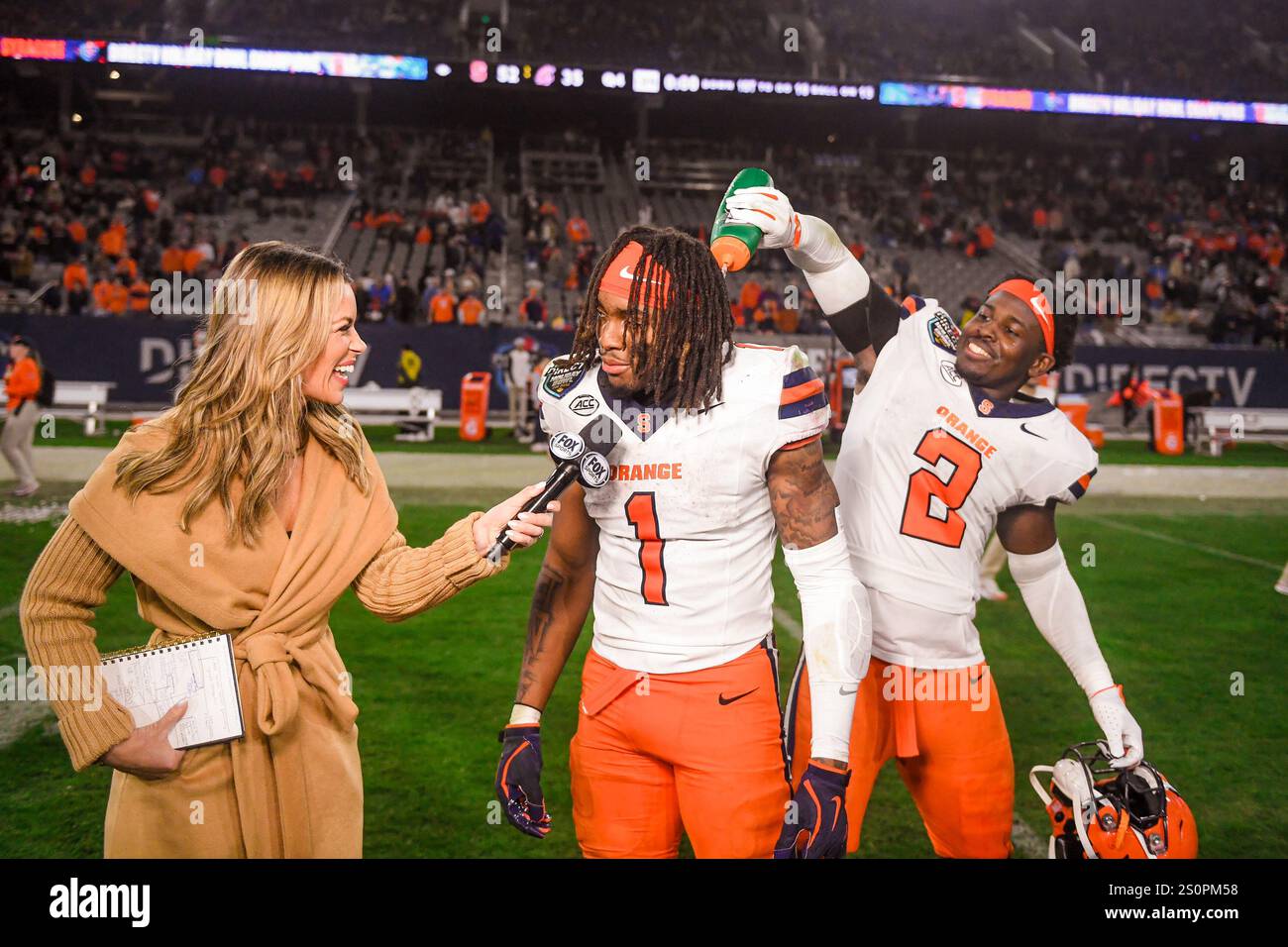 Syracuse Orange running back LeQuint Allen (1) is interviewed after the ...