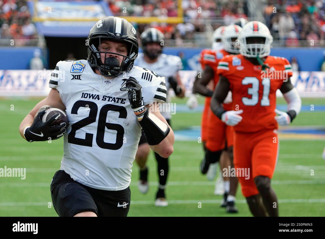 Iowa State running back Carson Hansen (26) runs a 30-yard touchdown ...