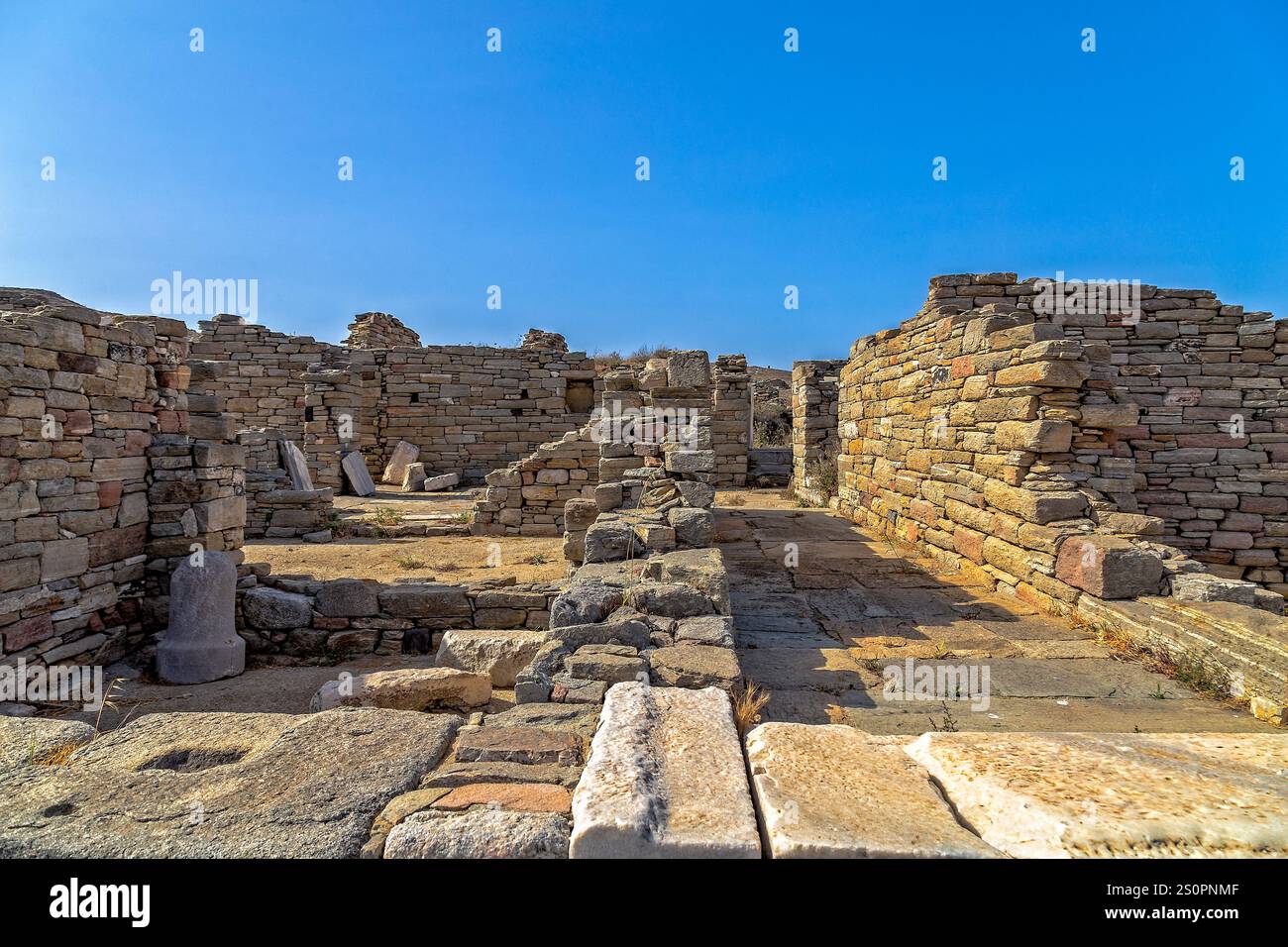Ancient Stone Walls With a Scenic Coastal View and Blue Sky Stock Photo ...