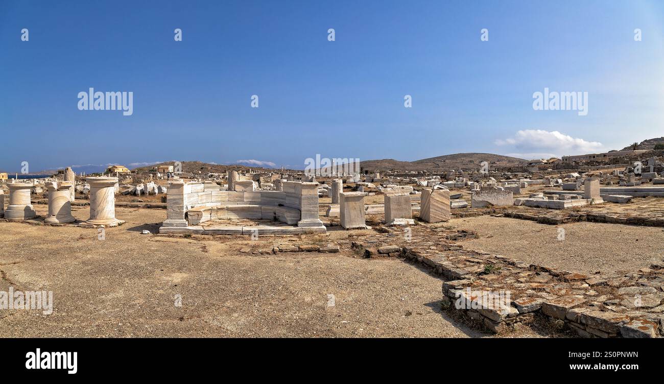 Ancient Ruins Under a Clear Sky Depicting Historical Stone Architecture ...
