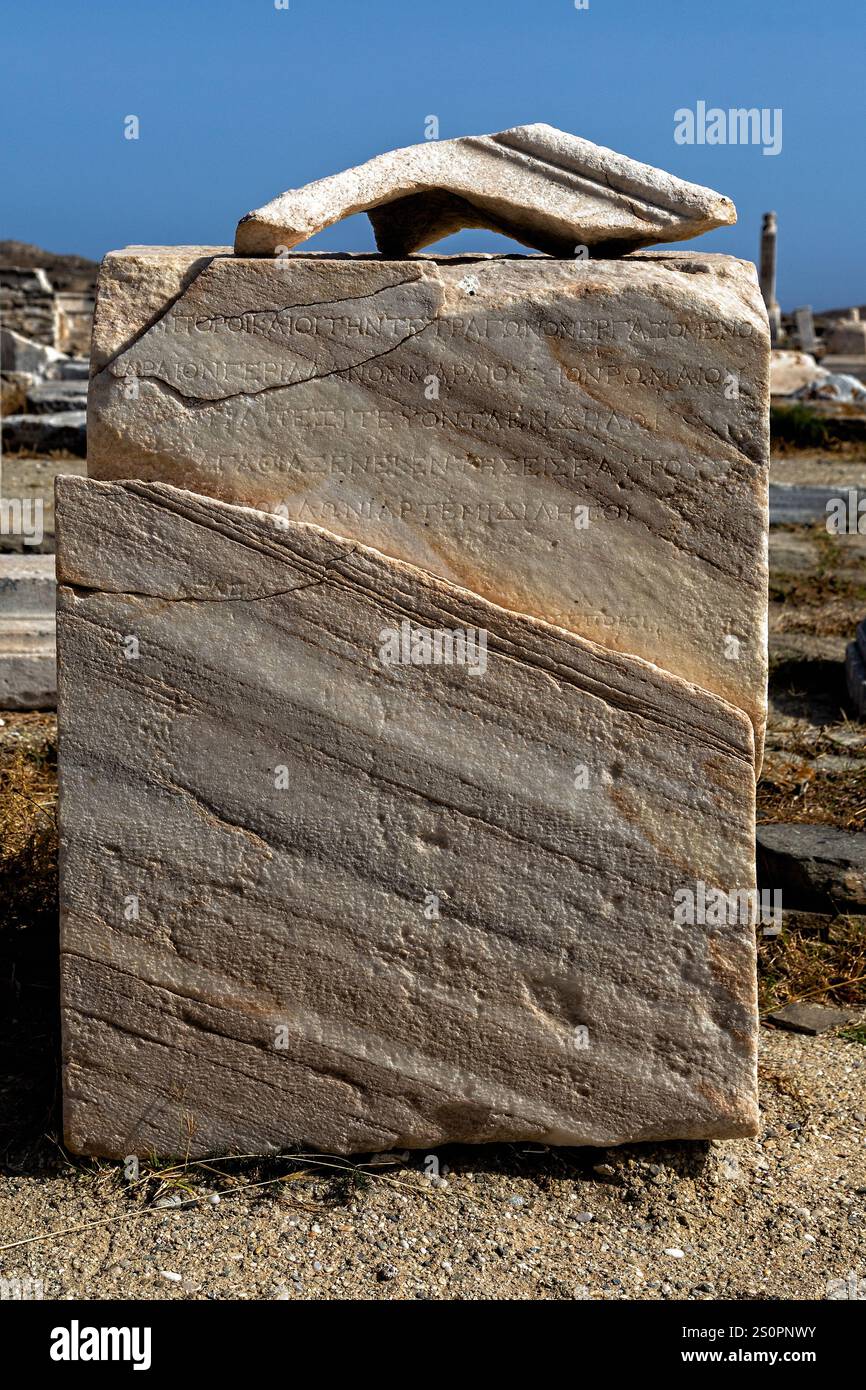 Ancient Weathered Stone Slab with Carved Details in Outdoor Setting ...